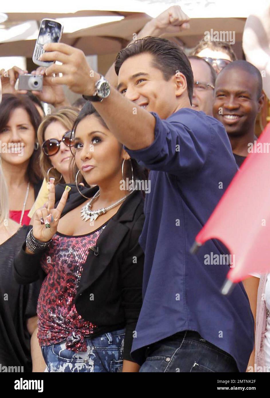 Wearing a typical outlandish Jersey-style outfit, "Jersey Shore" star ...