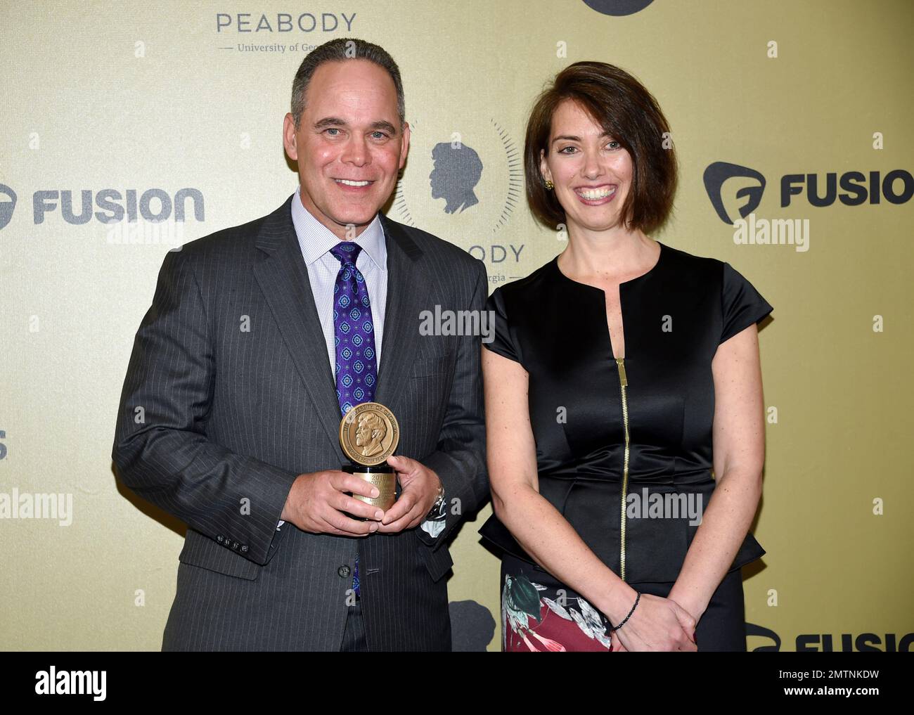 CBS national correspondent Jim Axelrod, left, and producer Ashley Velie ...