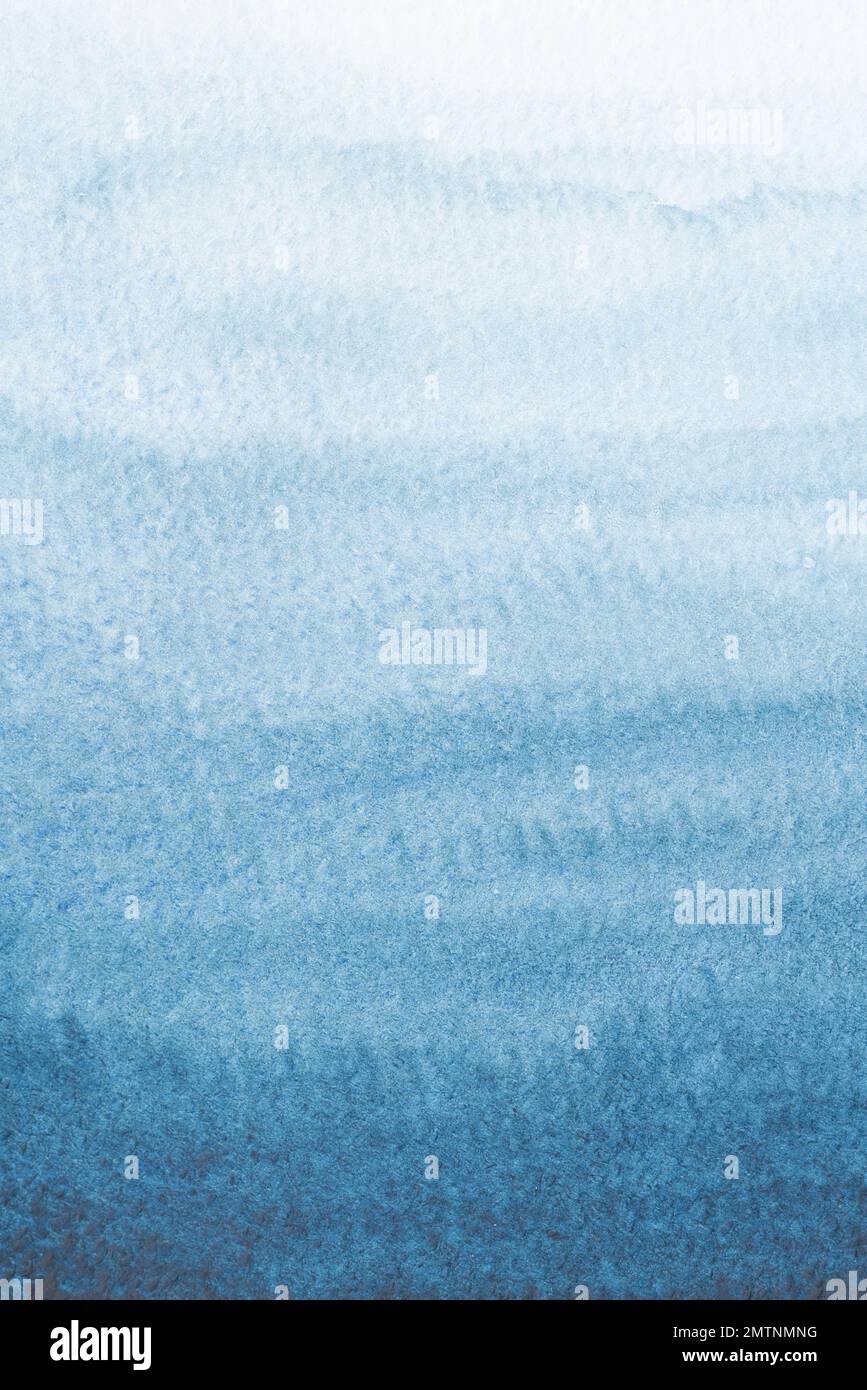 close-up soft stain liquid indigo deep blue water color on paper ...