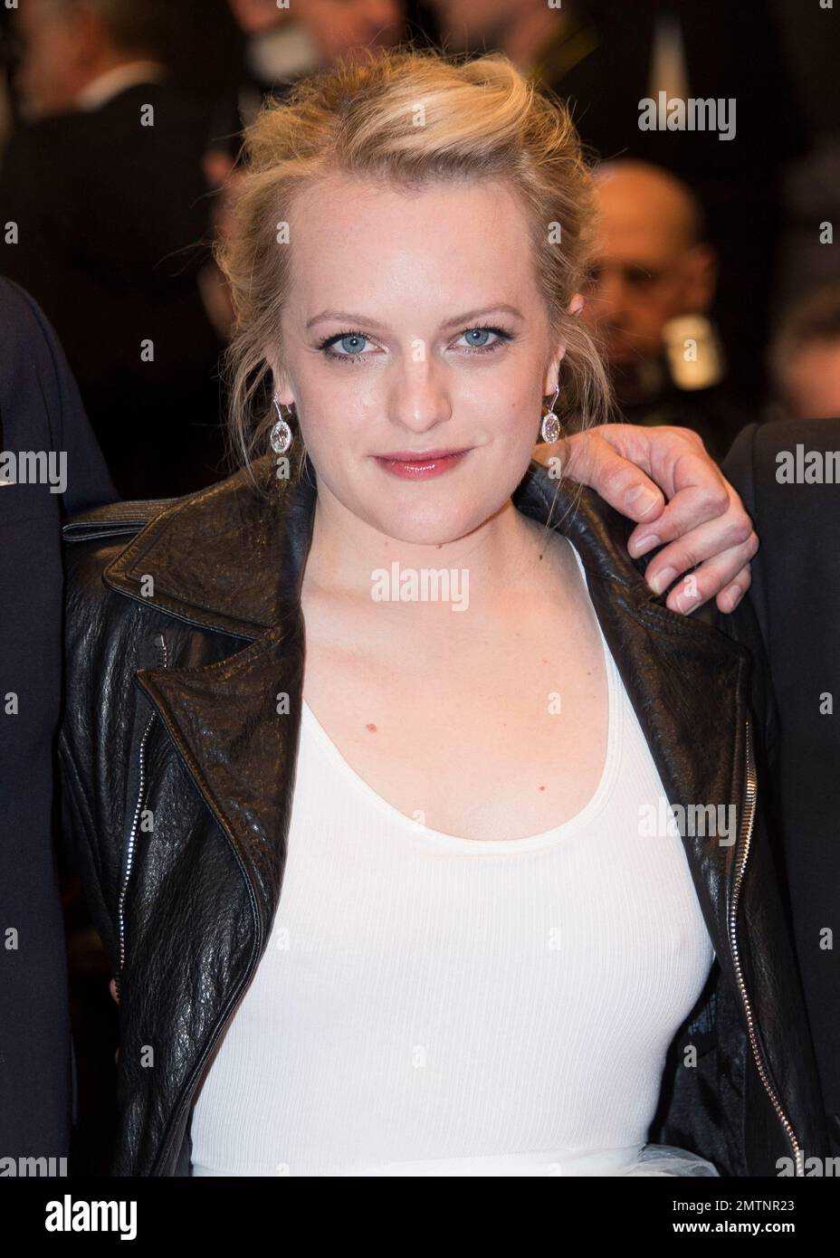 Actress Elisabeth Moss poses for photographers upon arrival at the ...
