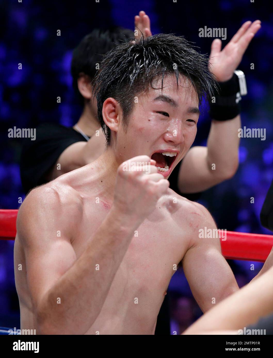 Japan's Shiro Ken celebrates after defeating Mexican champion Ganigan ...