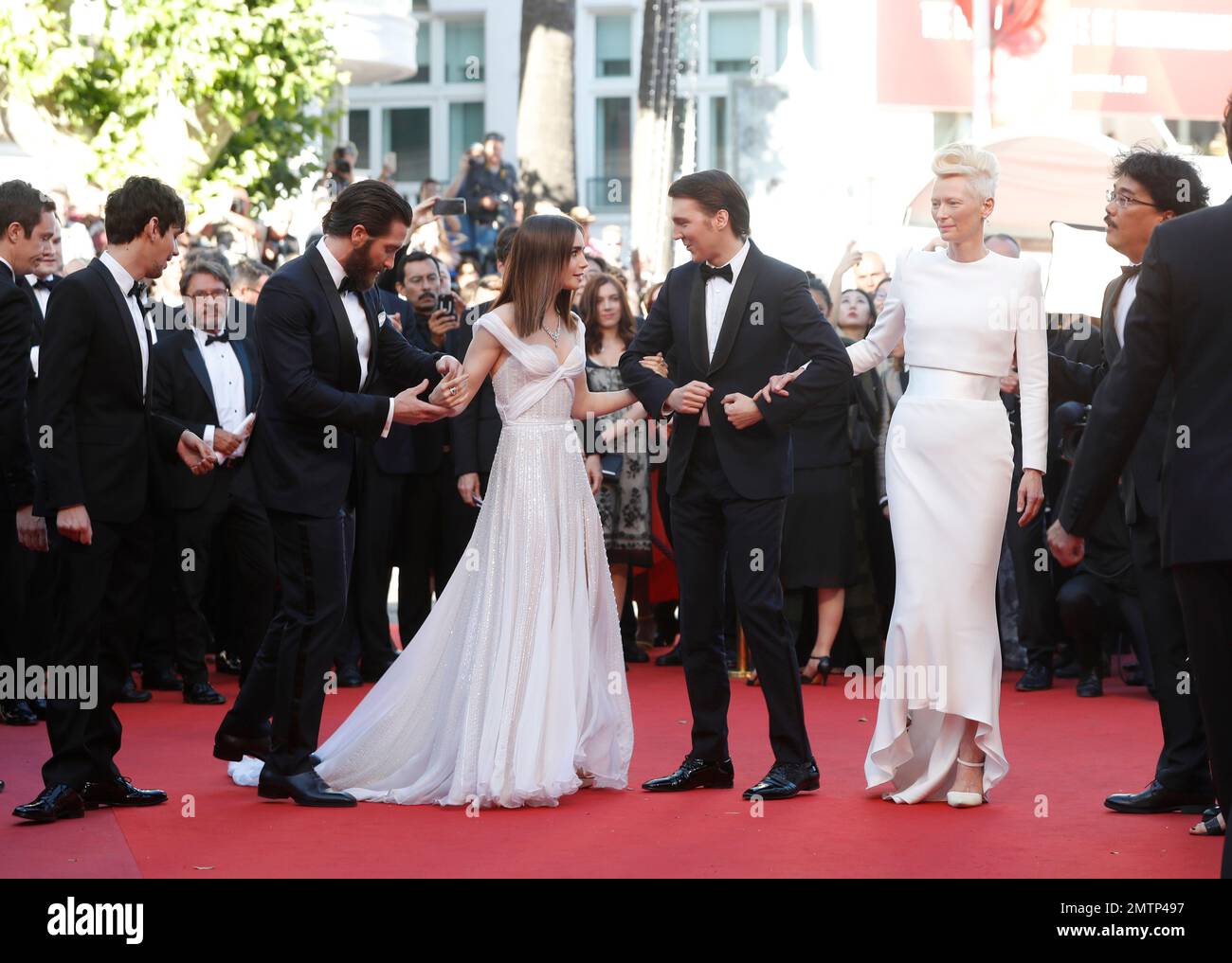 Actors Devon Bostick, from left, Jake Gyllenhaal, Lily Collins, Paul ...