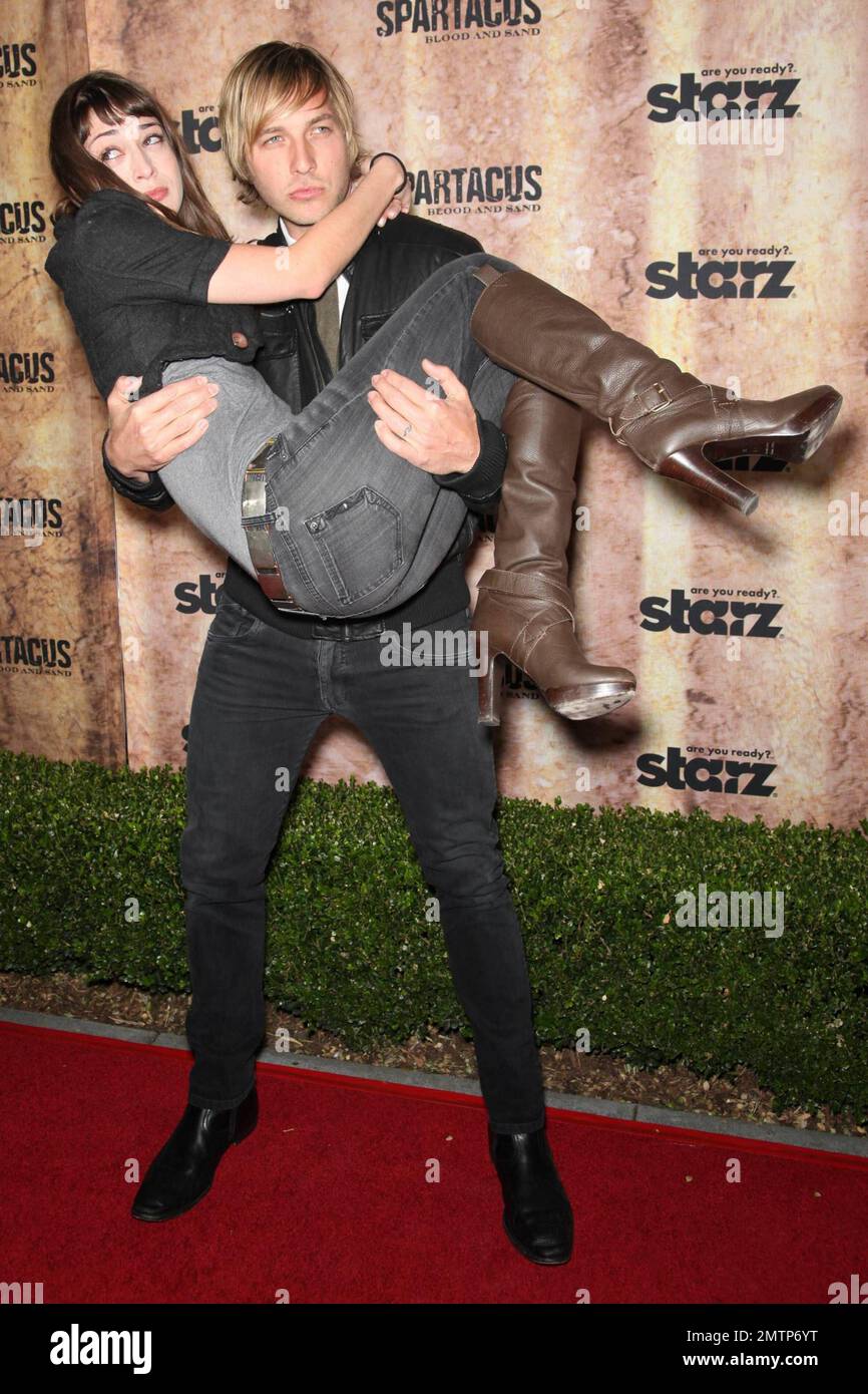 Lizzy Caplan and Ryan Hansen arrive to the premiere of upcoming Starz ...