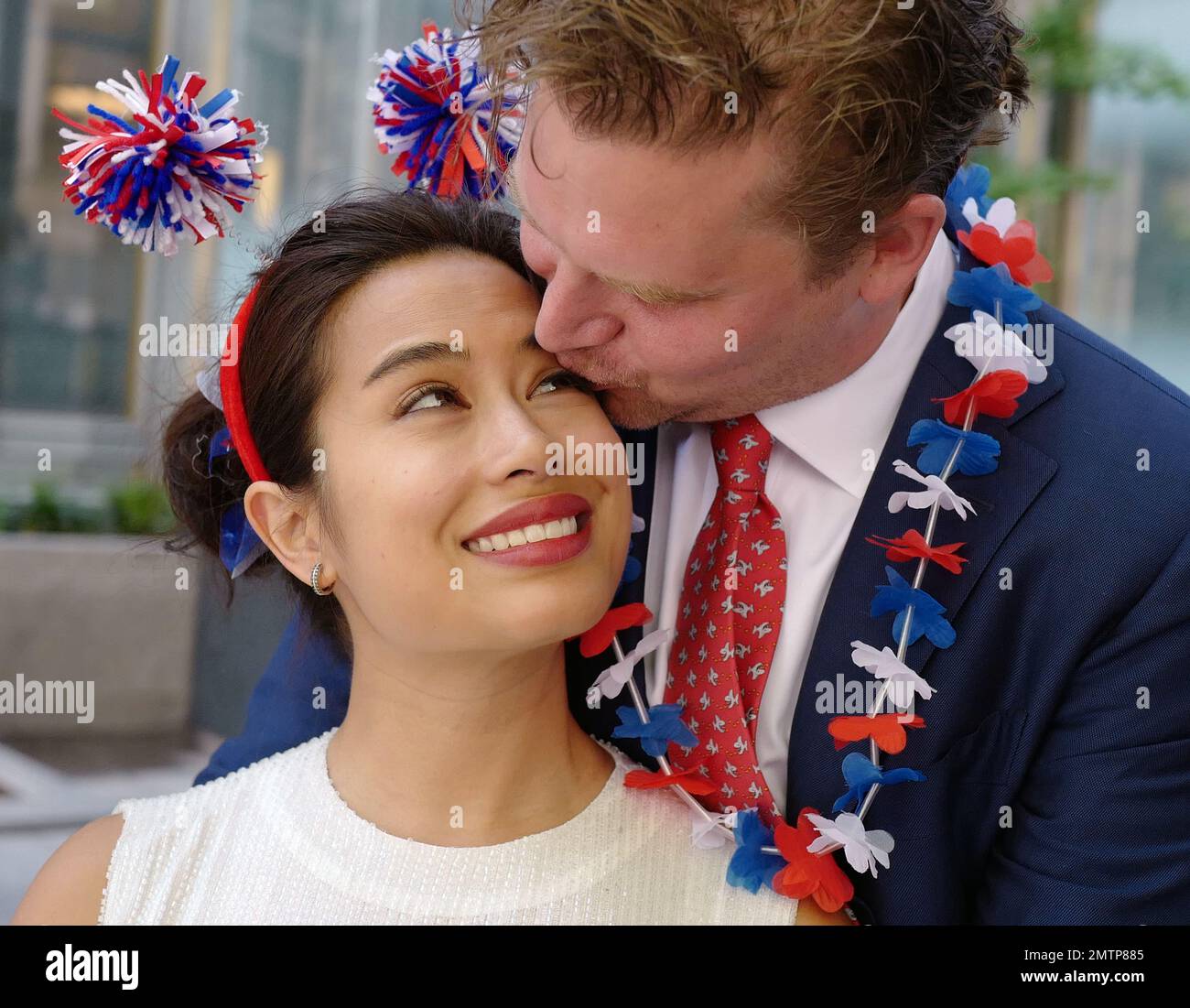 Eli Muis kisses his wife, Monica Delgado-Muis after she became a United ...
