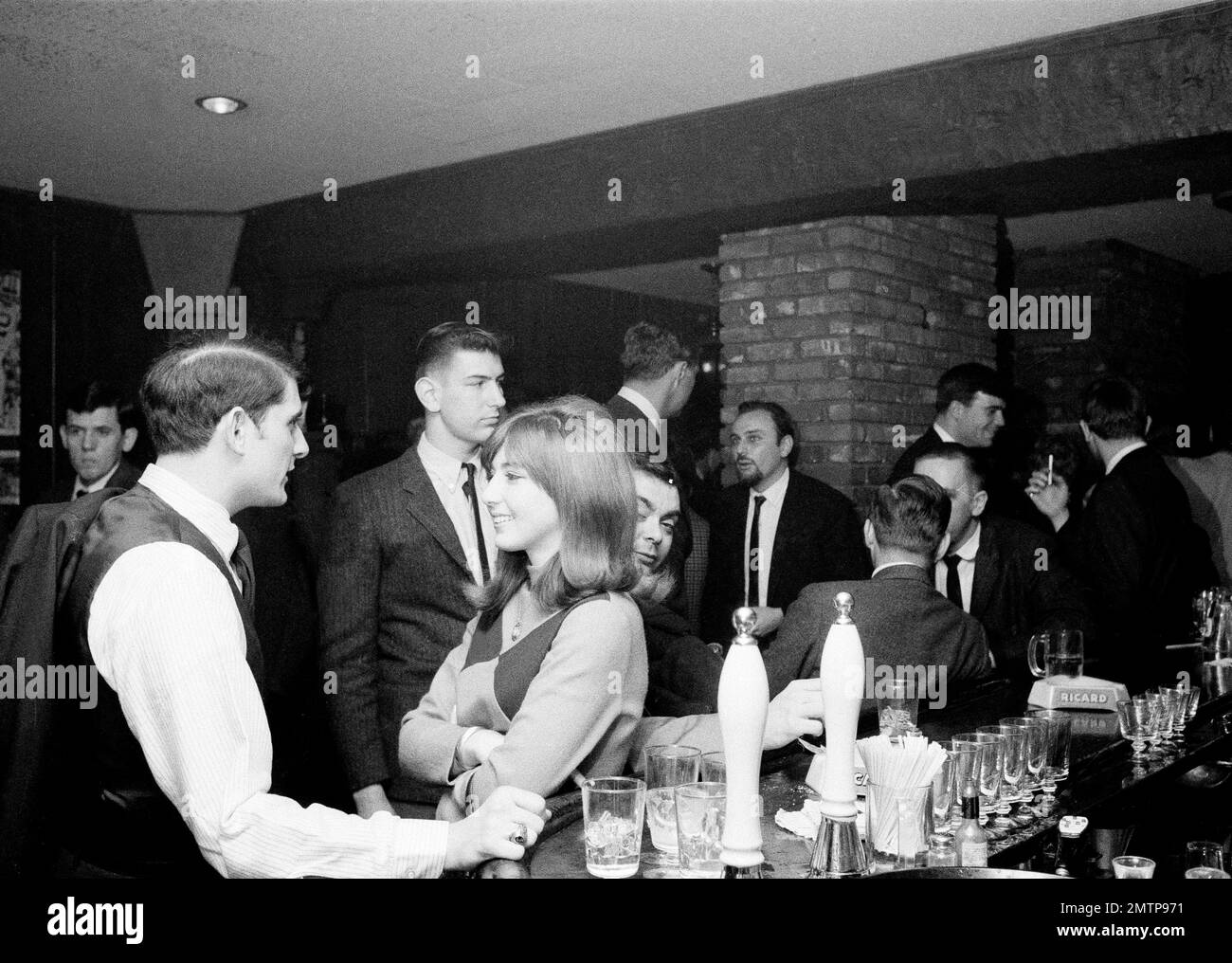 Members of today's "smart-set" mingle at the fashionable Upper East ...