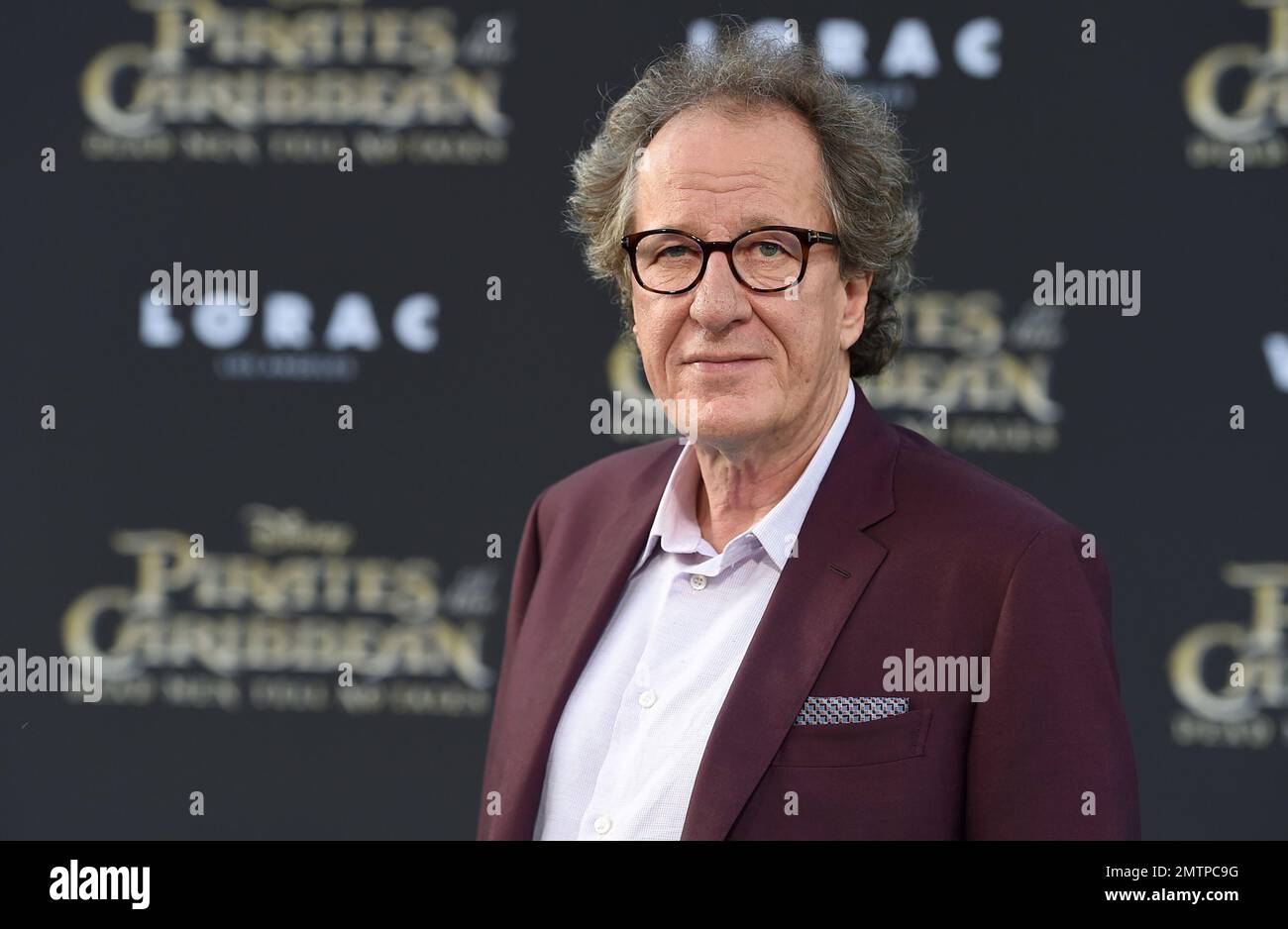 Geoffrey Rush arrives at the Los Angeles premiere of "Pirates of the ...