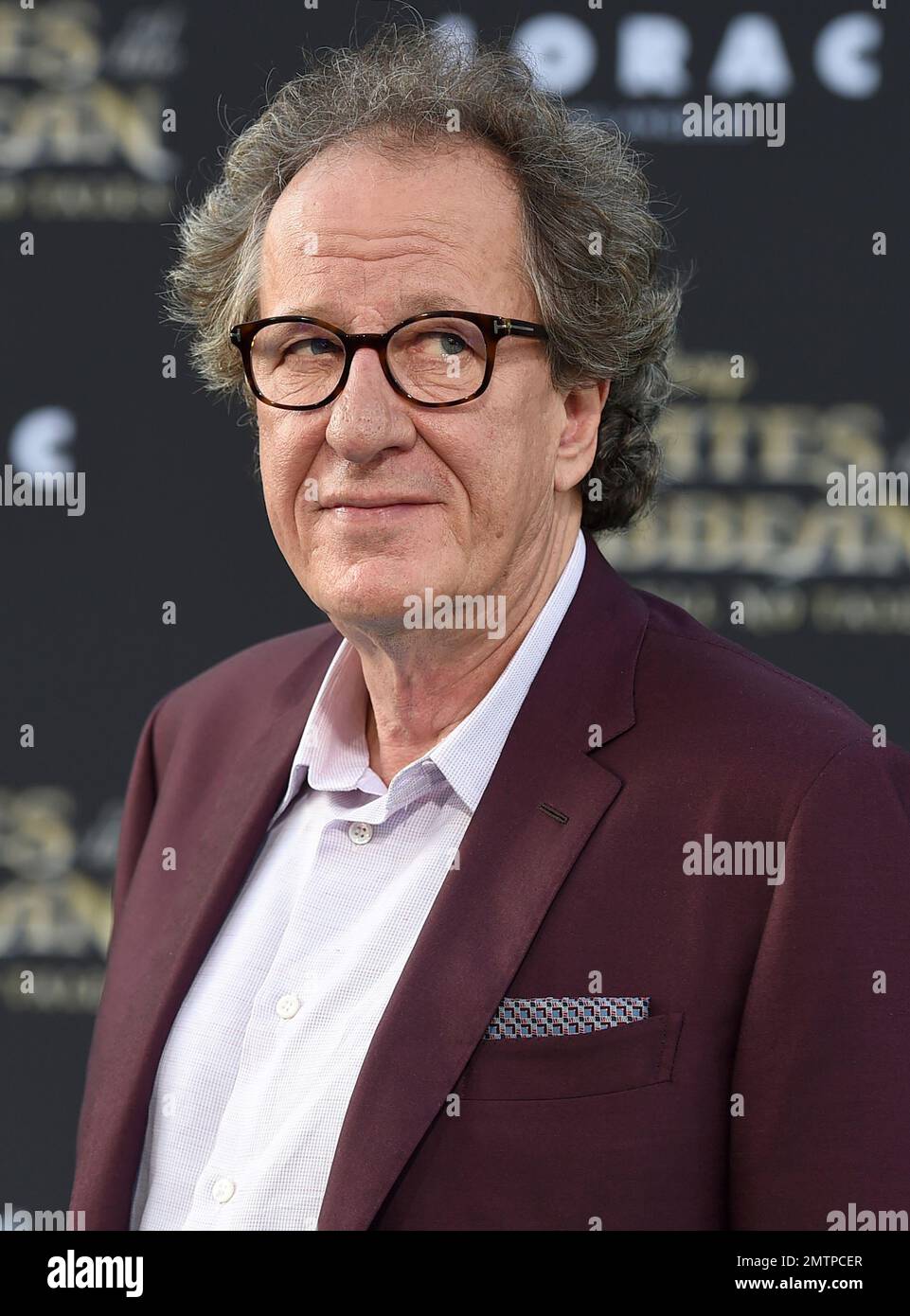 Geoffrey Rush arrives at the Los Angeles premiere of "Pirates of the ...
