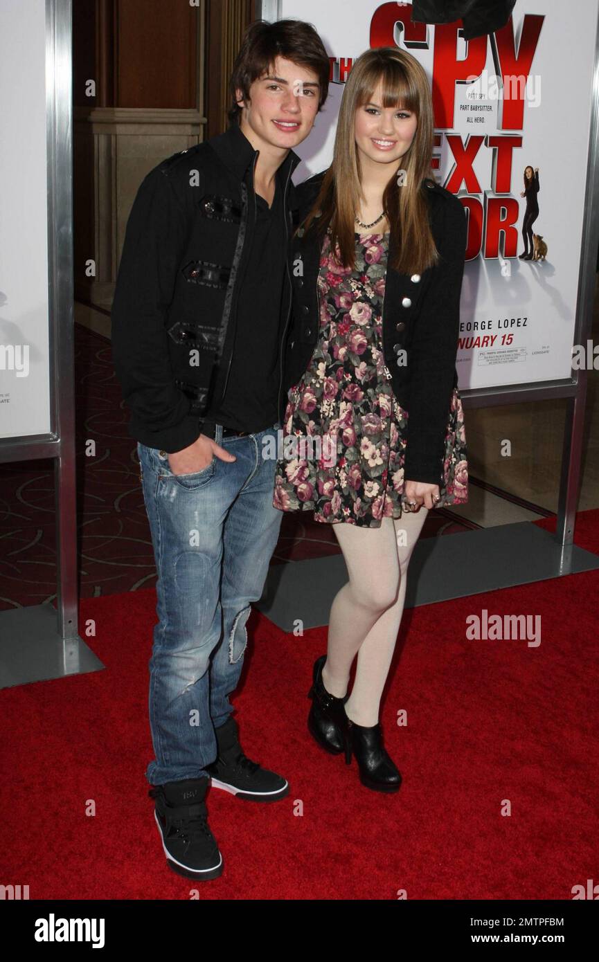 Greg Sulkin and Debby Ryan at the world premiere of "The Spy Next Door ...