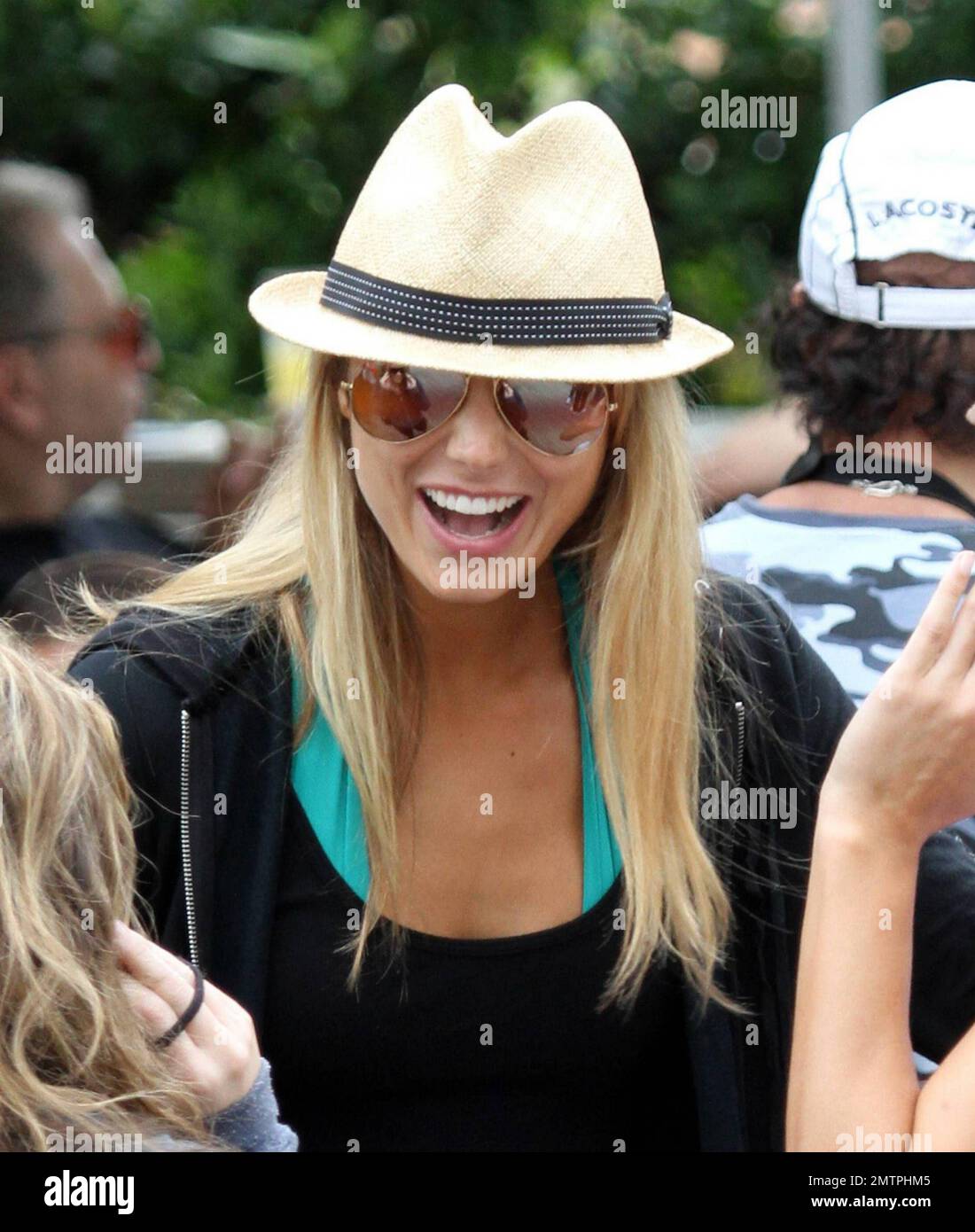 Stacy Keibler shares a laugh with pals on New Years Day at the ...