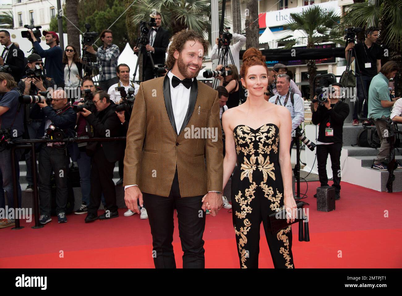 Actor T.J. Miller, left, and Kate Gorney pose for photographers upon ...