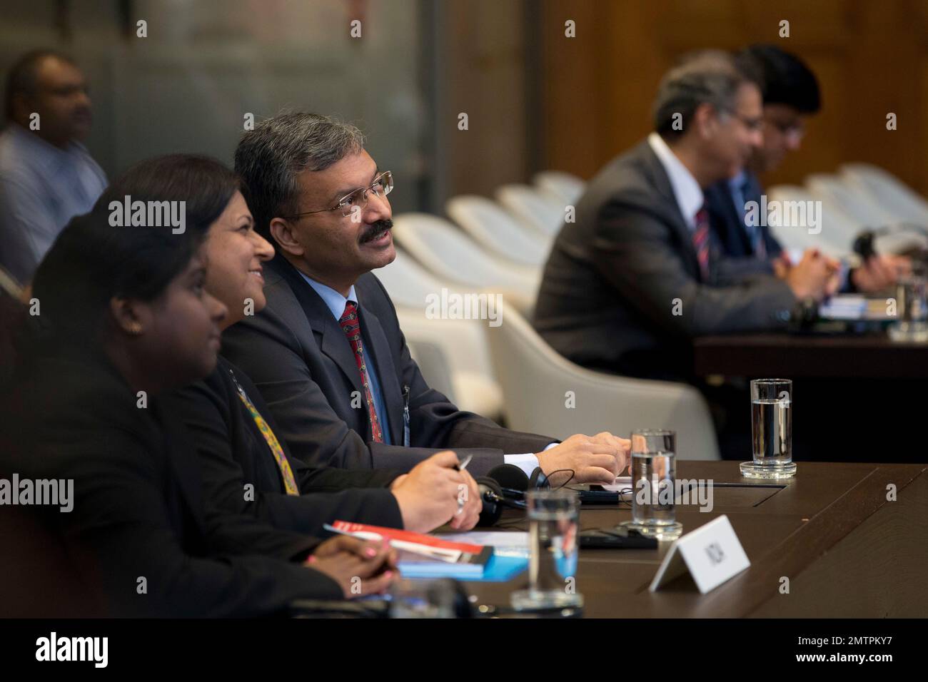 Dr. Deepak Mittal, joint secretary of India's Ministry of External Affairs, third from left, and ...