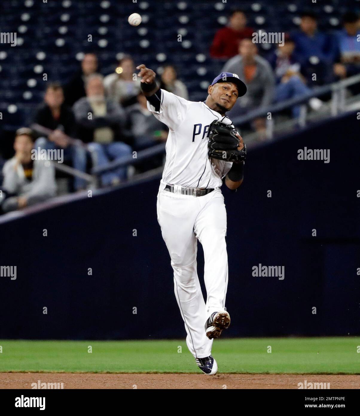 San Diego Padres shortstop Erick Aybar throws to first for the out on ...