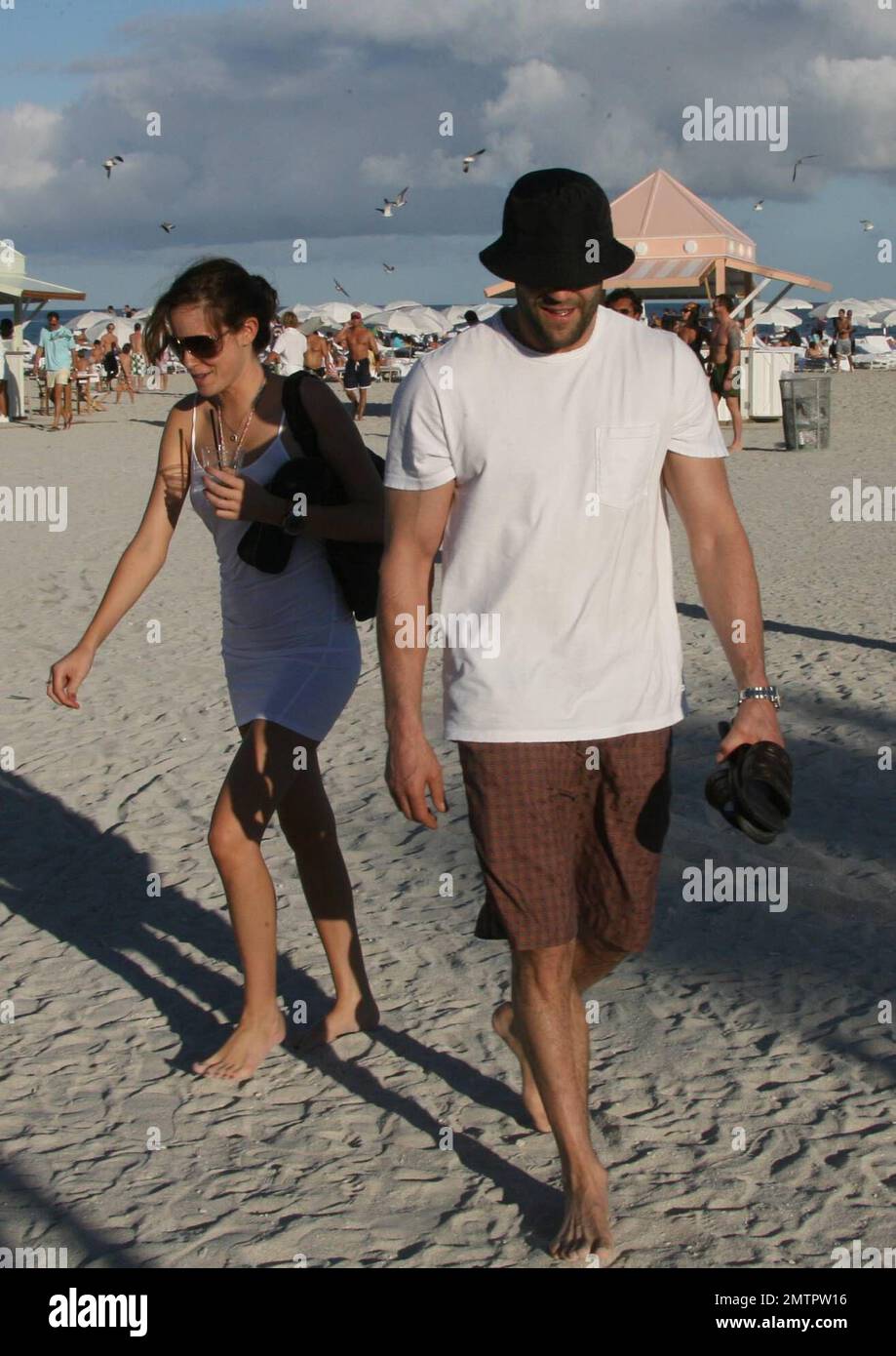 UK hardman actor Jason Statham leaves the beach after a chilled New ...