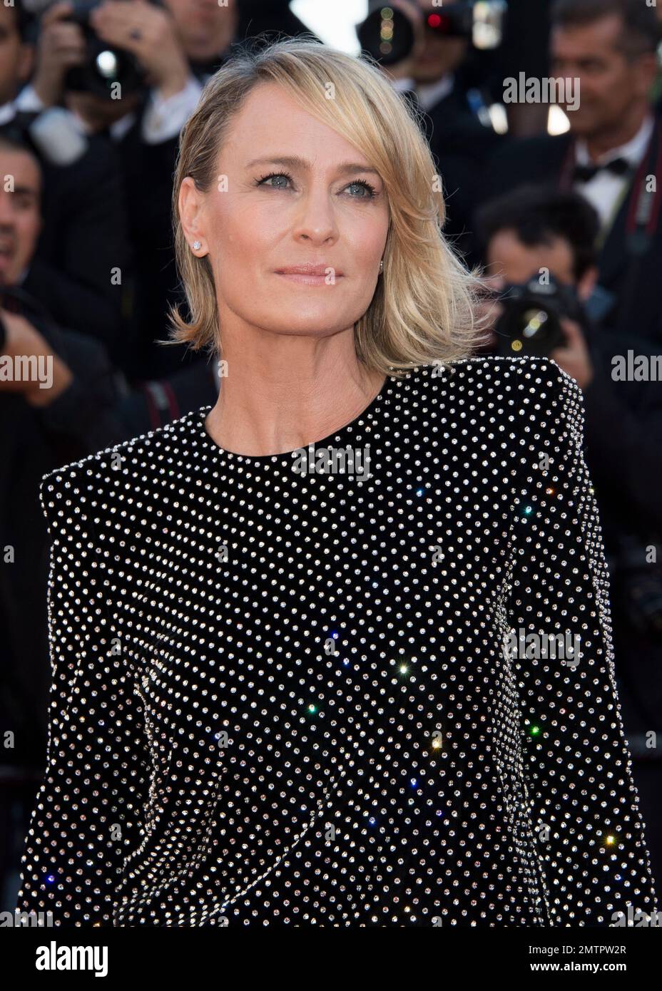 Actress Robin Wright poses for photographers upon arrival at the ...