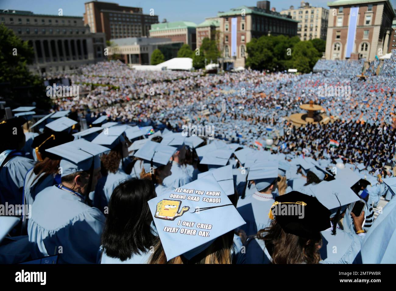 Graduating students fill the Columbia University campus during a ...
