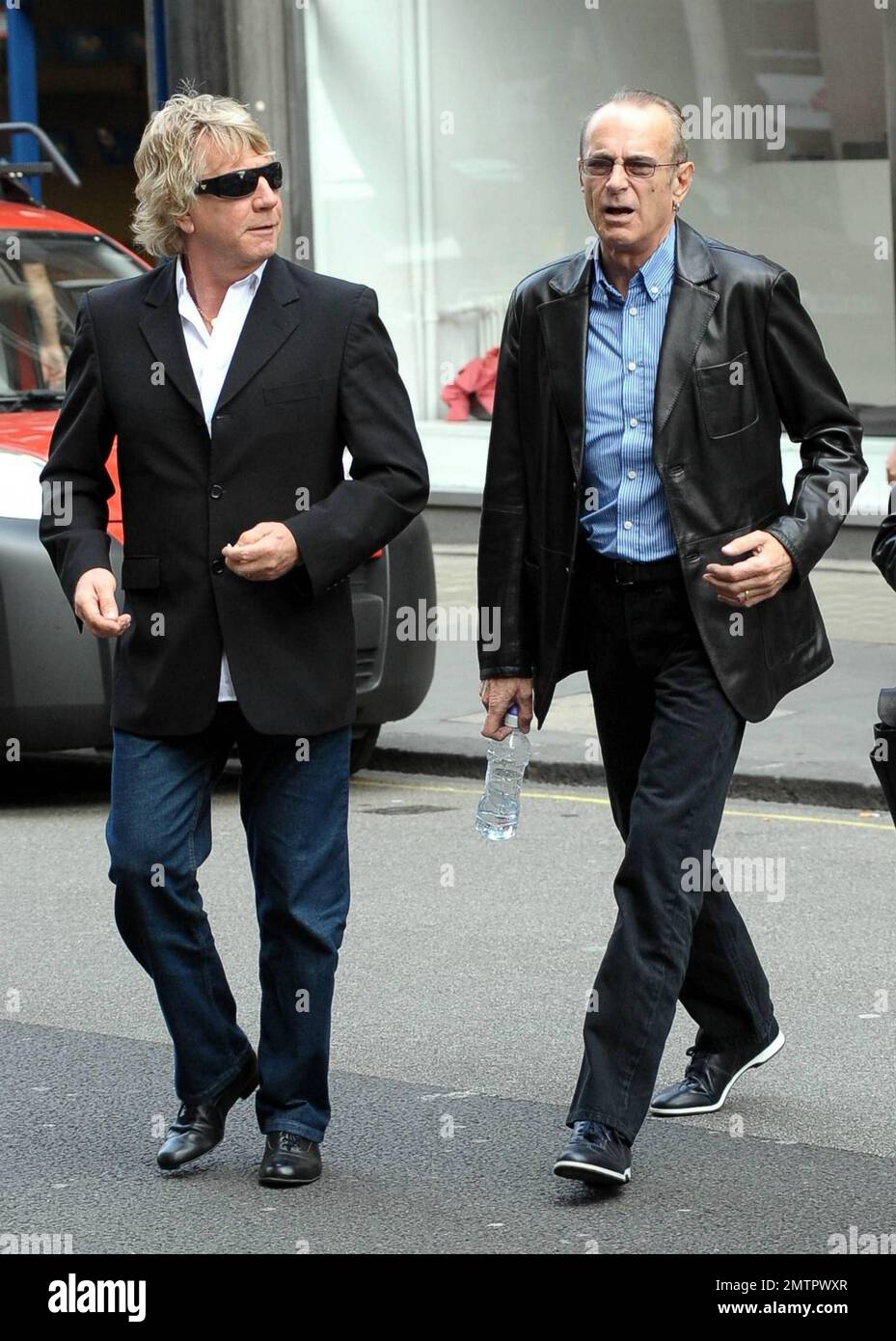 Status Quo look a bit like hitmen as they arrive at the BBC for an ...