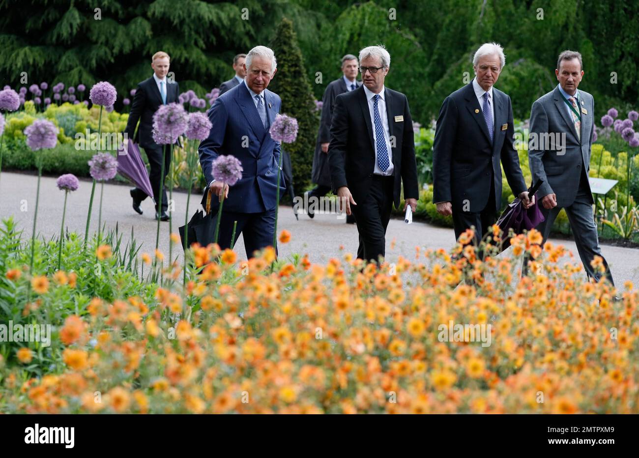 Britain's Prince Charles, front left, tours the Great Broad Walk during ...