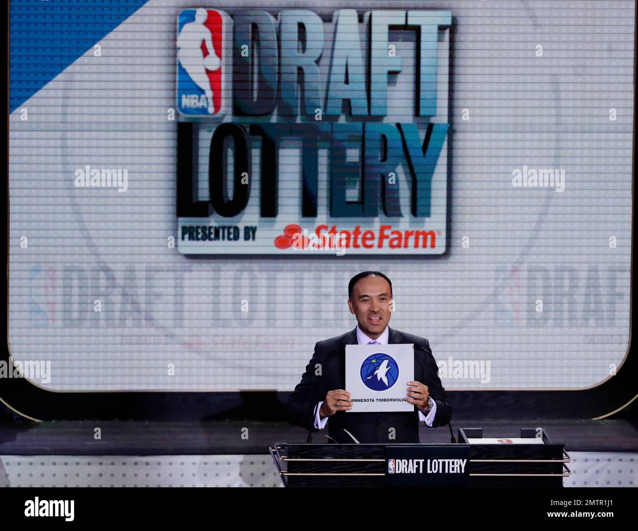 NBA deputy commissioner Mark Tatum announces the draft position for the ...