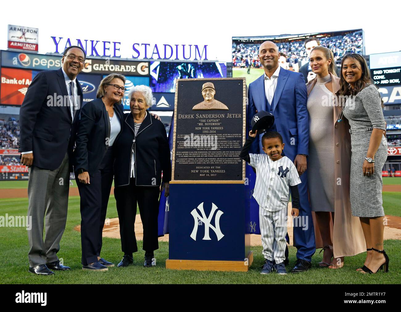 Retired New York Yankees shortstop Derek Jeter, third from right, poses ...