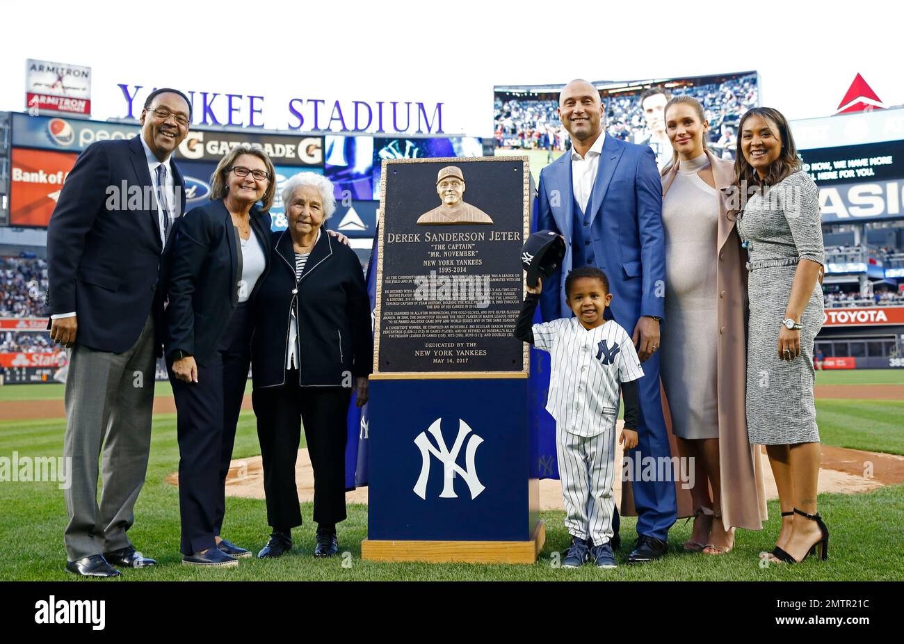 Retired New York Yankees shortstop Derek Jeter, third from right, poses ...
