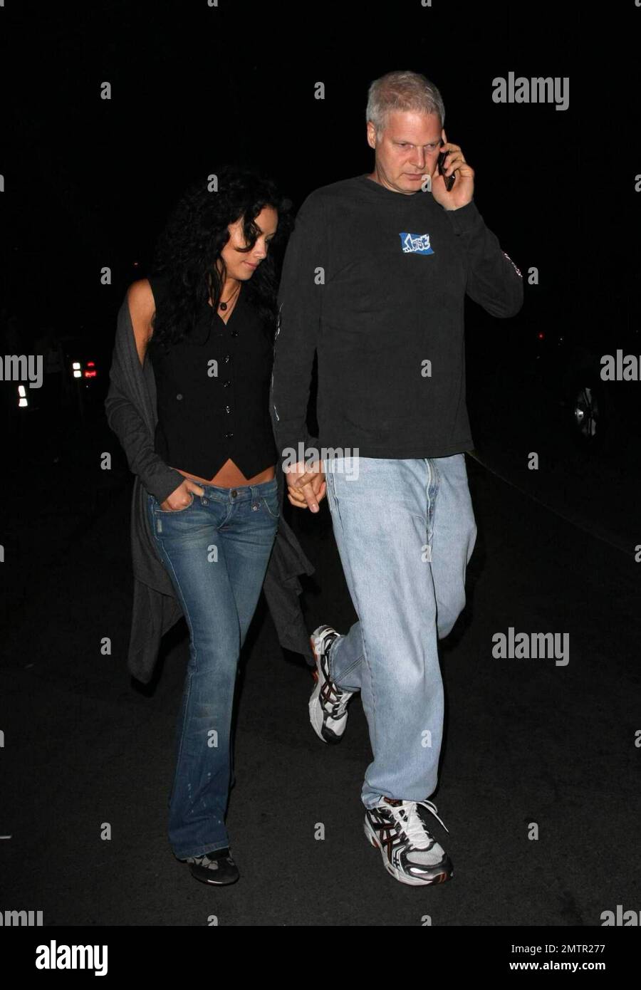 Steve Bing and his date attend Eric Clapton's concert at the Hollywood ...