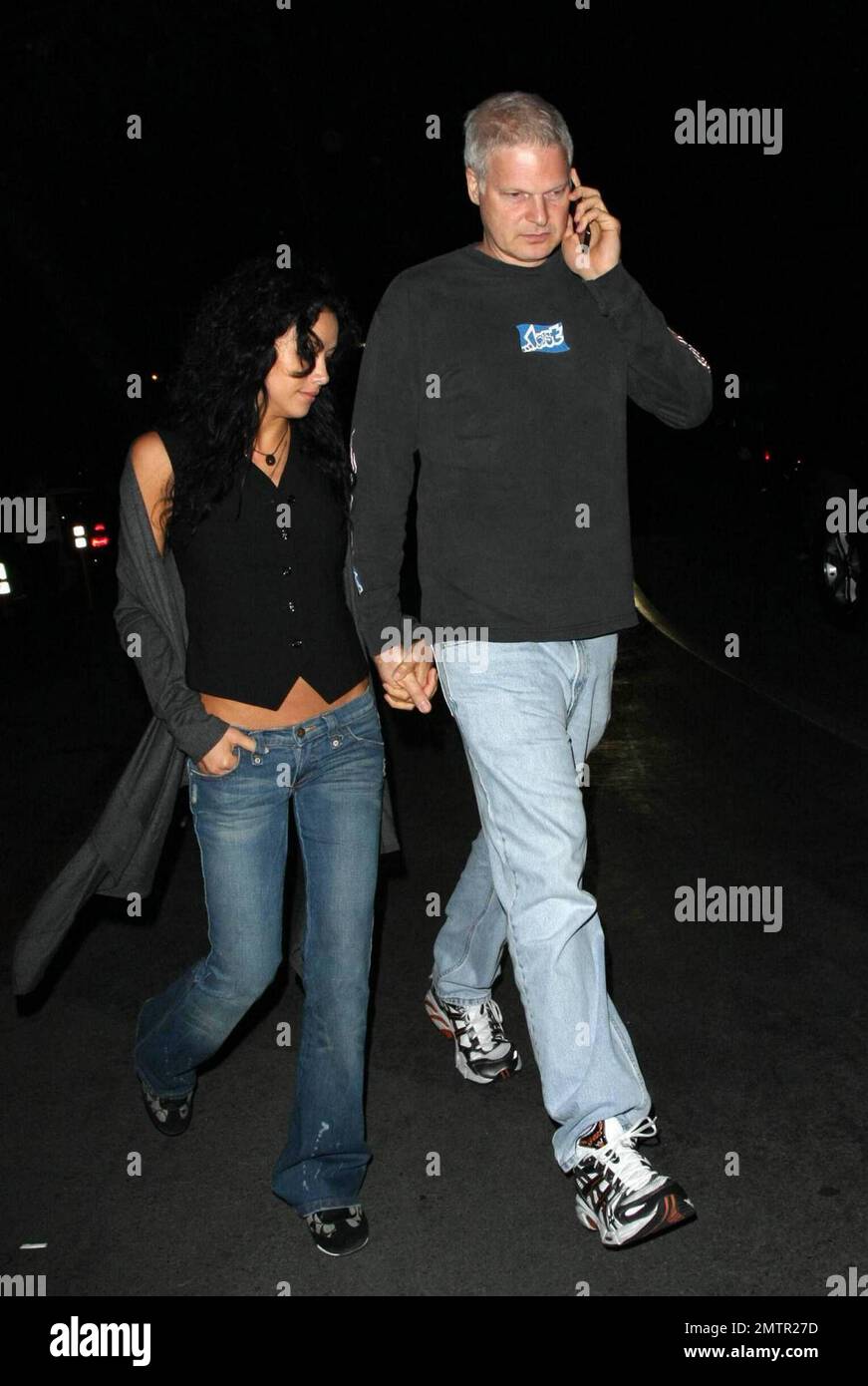 Steve Bing and his date attend Eric Clapton's concert at the Hollywood ...