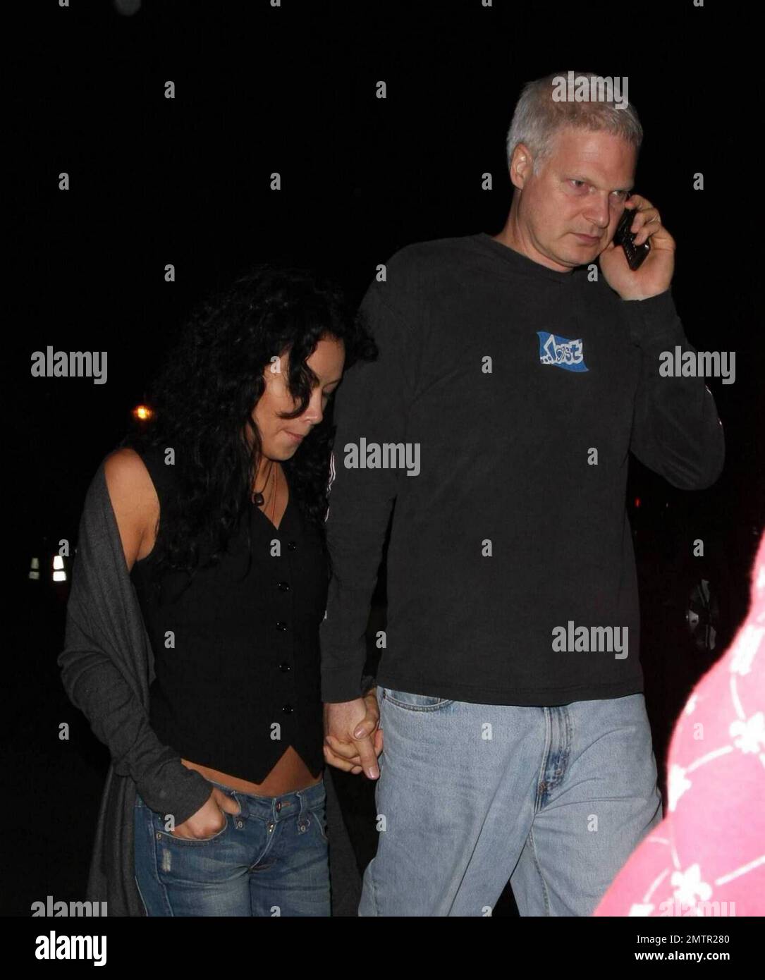 Steve Bing and his date attend Eric Clapton's concert at the Hollywood ...