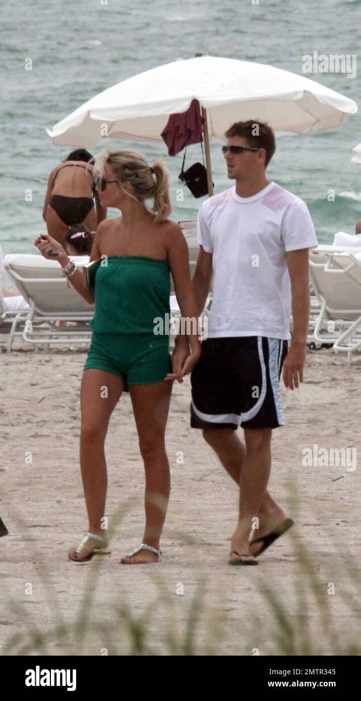 Steven Gerrard, Alex Curran and friends take a stroll on the beach ...