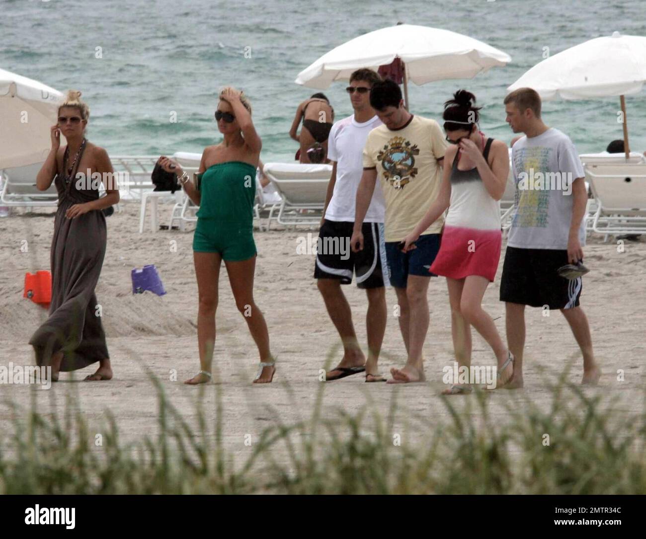 Steven Gerrard, Alex Curran and friends take a stroll on the beach ...