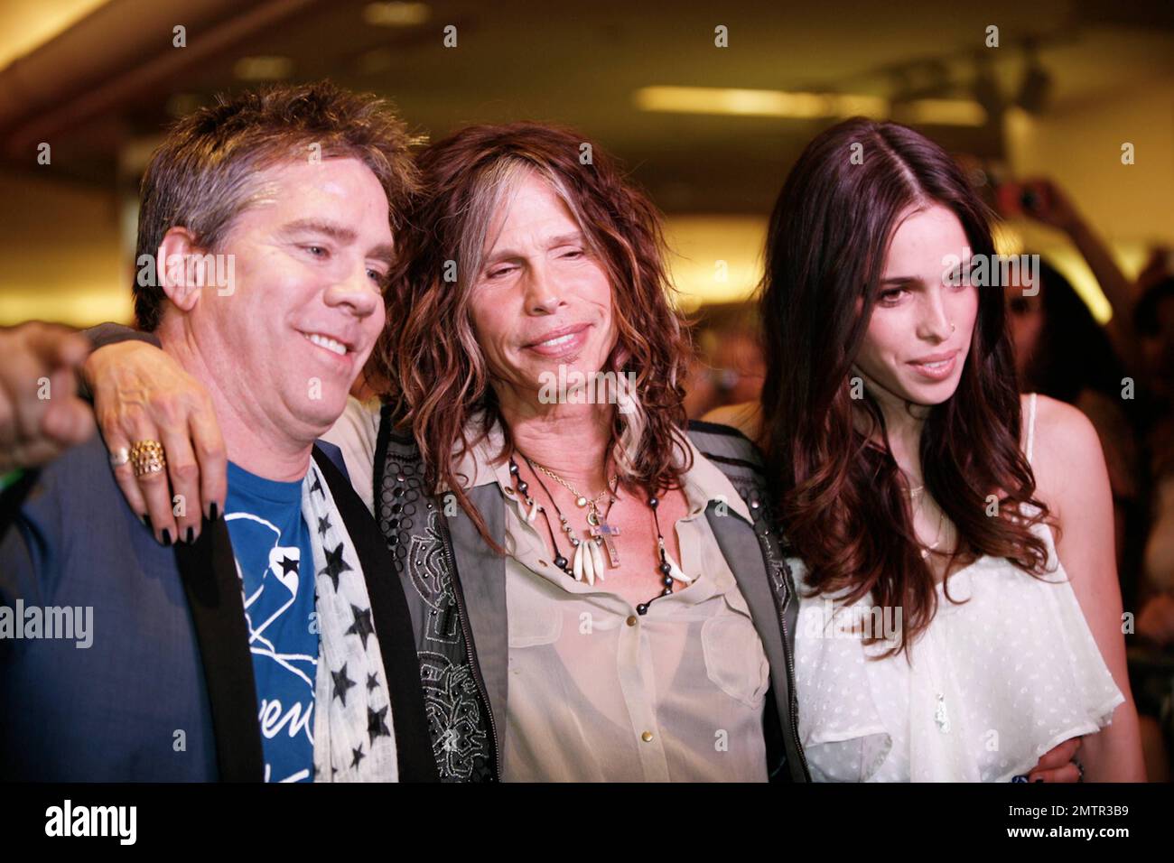 Designer Andy Hilfiger, Steven Tyler and daughter Chelsea Tyler walk ...