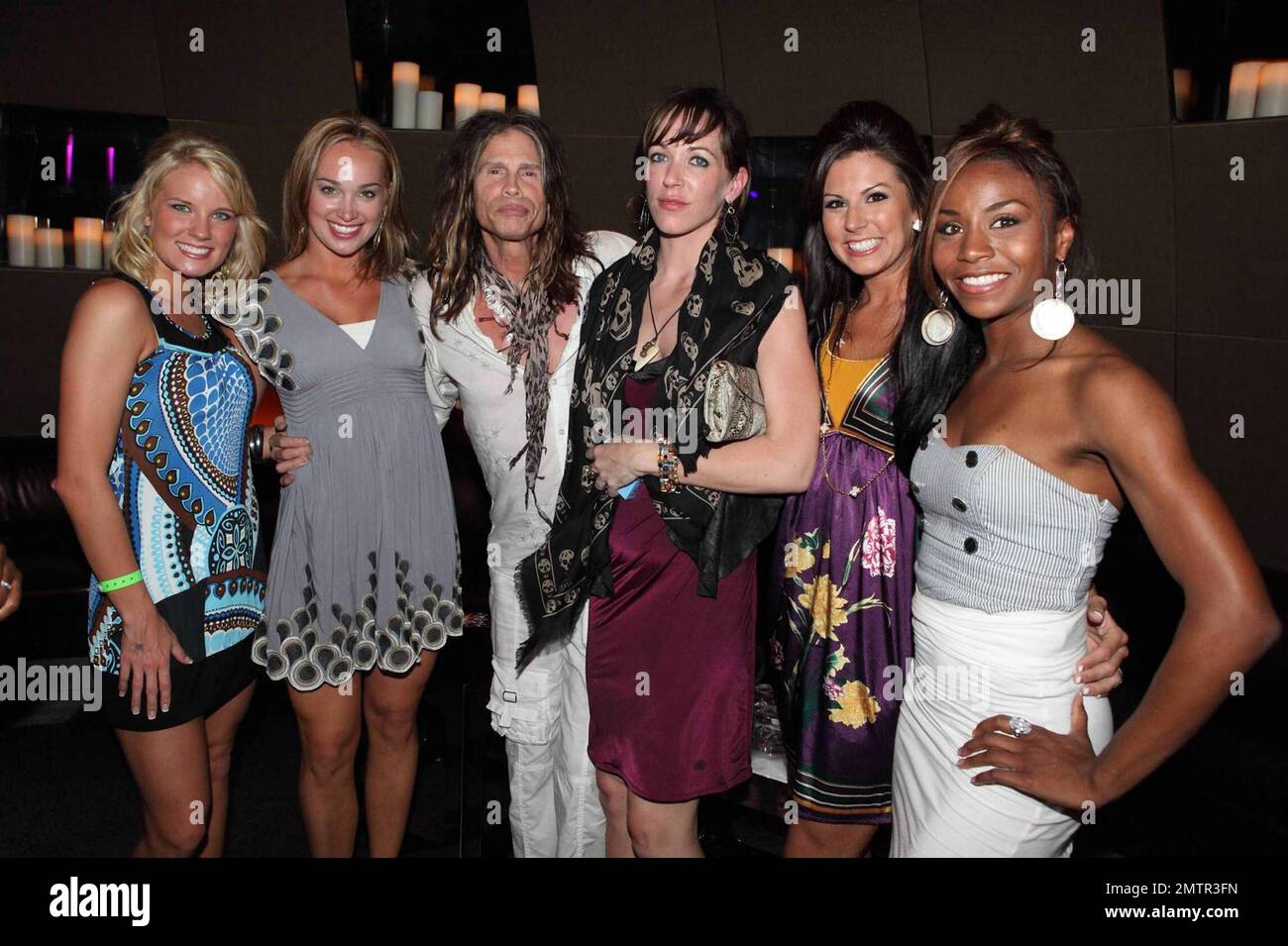 Aerosmith singer Steven Tyler poses with girlfriend Erin Brady and the ...