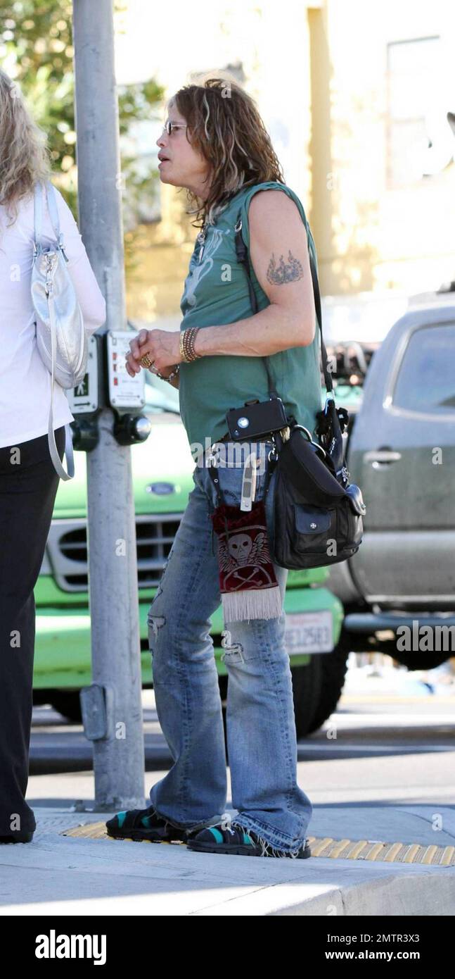 EXCLUSIVE!! Aerosmith rocker Steven Tyler takes Man Bag to a whole new ...