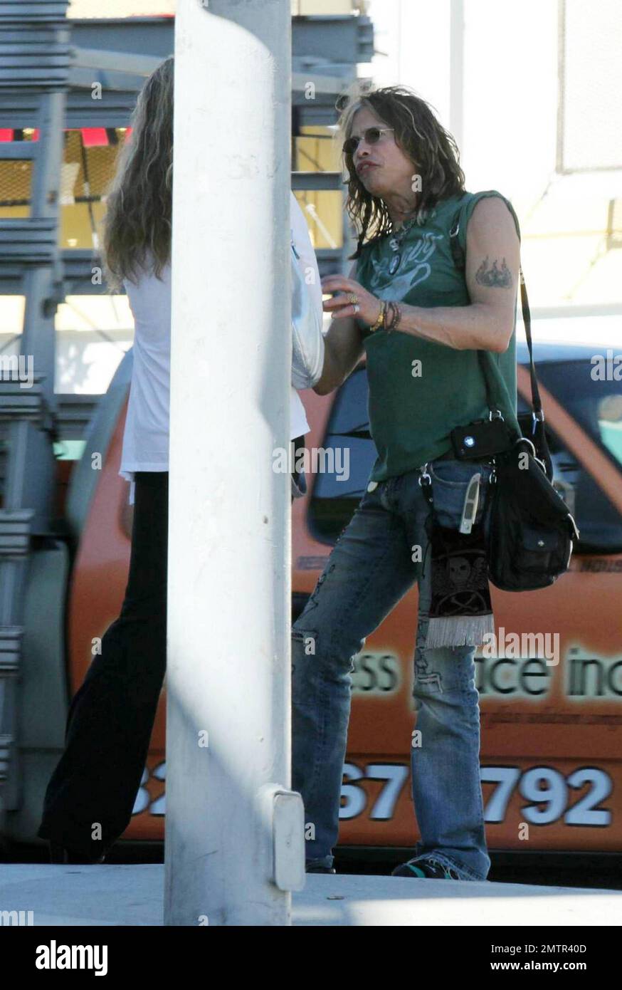 EXCLUSIVE!! Aerosmith rocker Steven Tyler takes Man Bag to a whole new ...