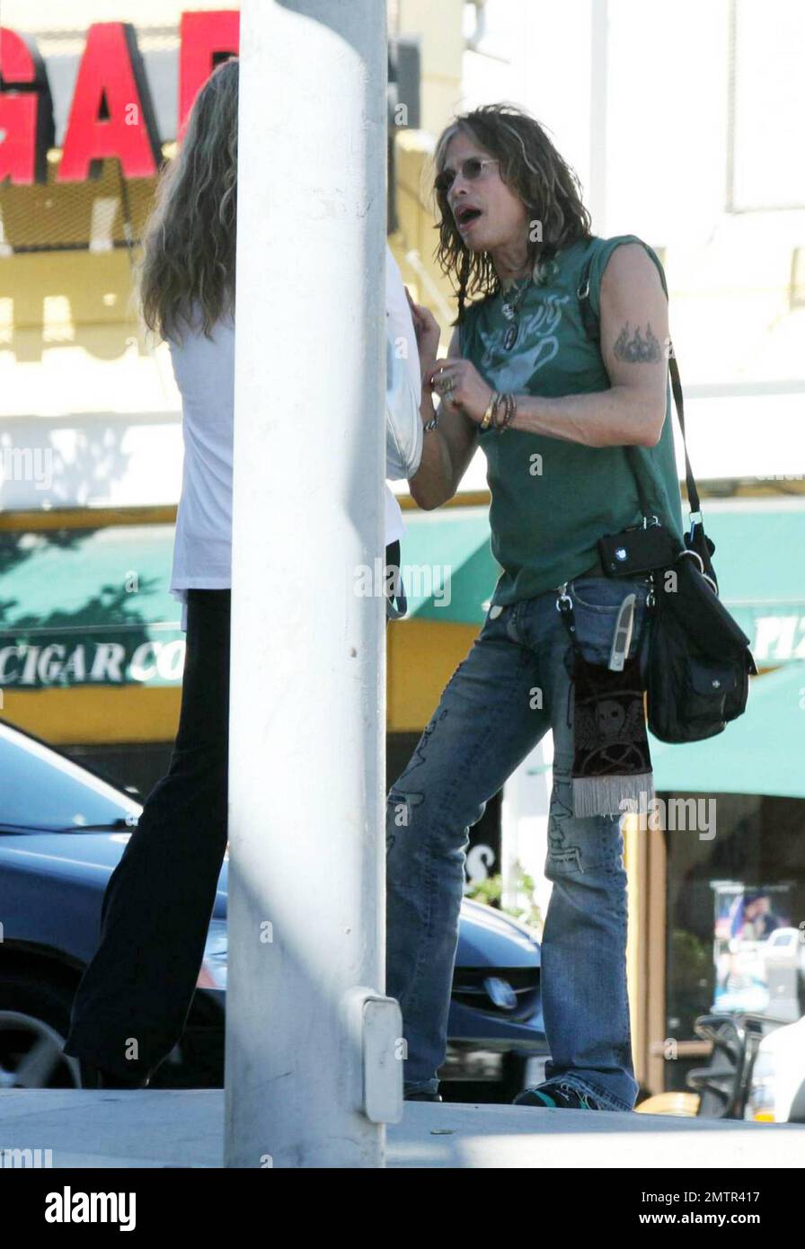 EXCLUSIVE!! Aerosmith rocker Steven Tyler takes Man Bag to a whole new ...