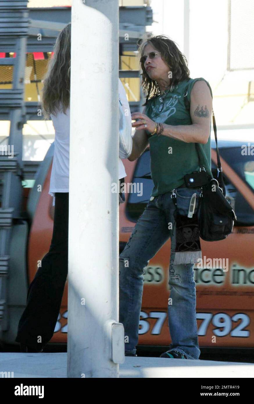 EXCLUSIVE!! Aerosmith rocker Steven Tyler takes Man Bag to a whole new ...