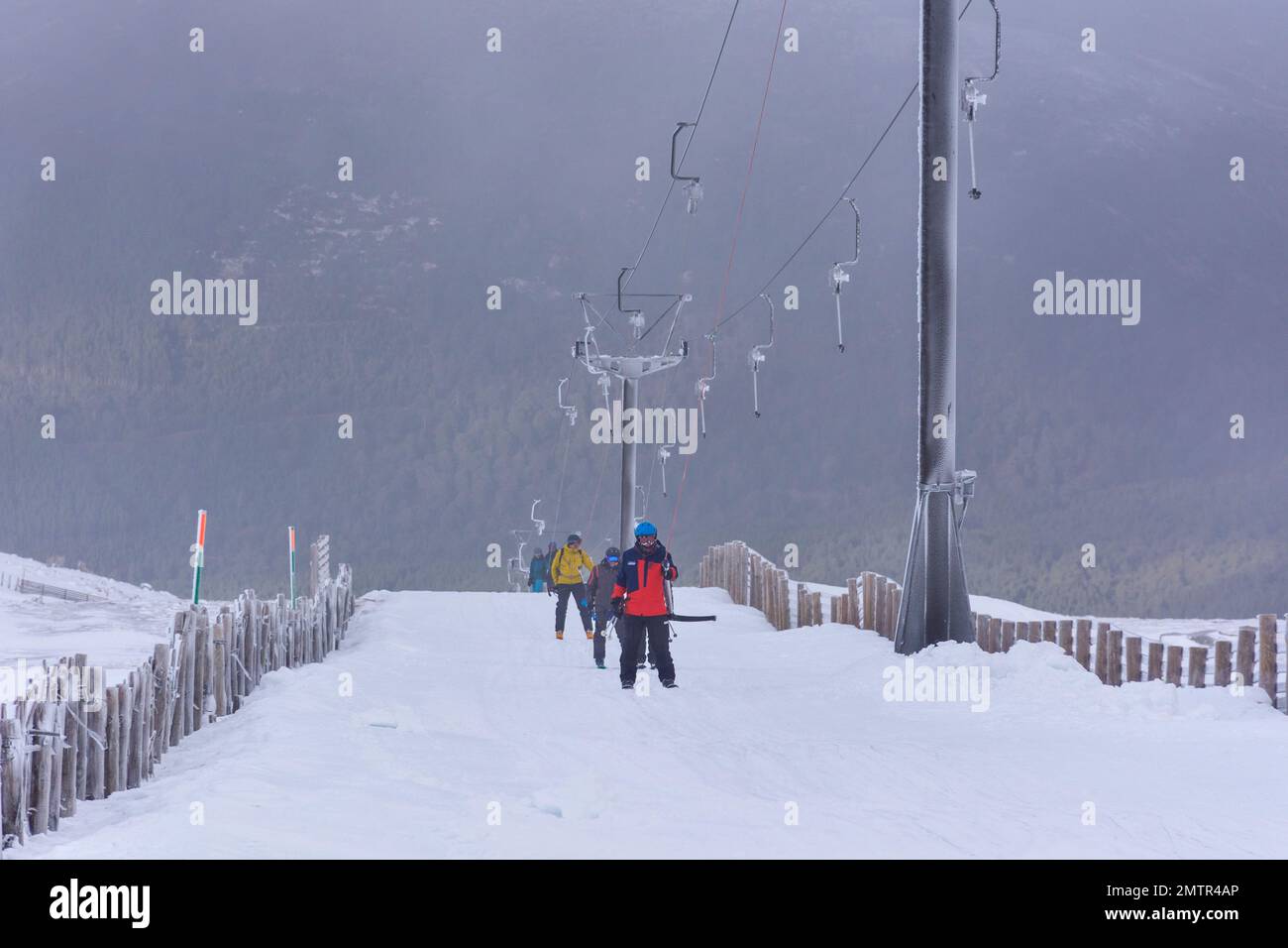Cairngorm Mountain Aviemore Top Station Ski Pistes six skiers arriving ...