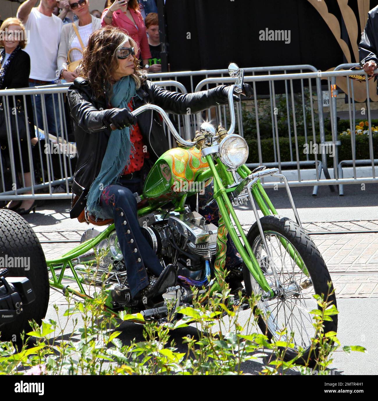 Steven Tyler arrives on a custom motorcycle tricycle at the press ...