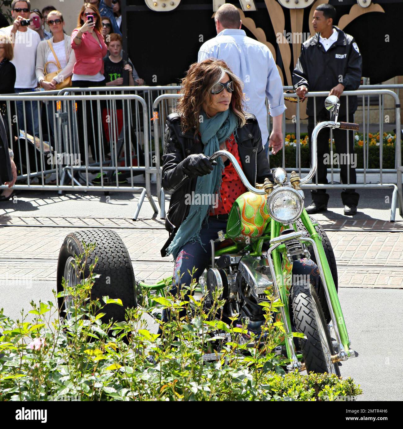 Steven Tyler arrives on a custom motorcycle tricycle at the press ...