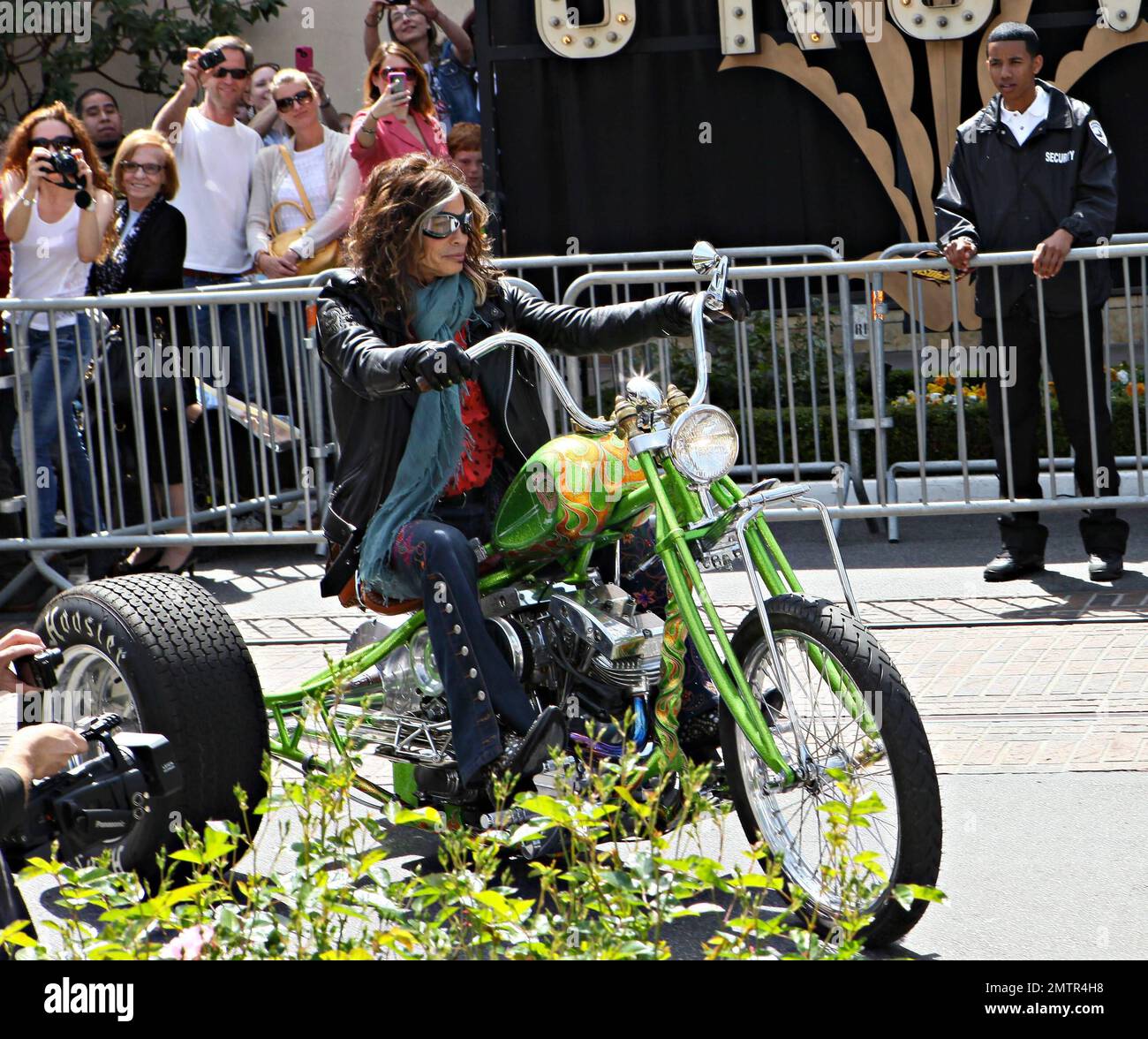 Steven Tyler arrives on a custom motorcycle tricycle at the press ...