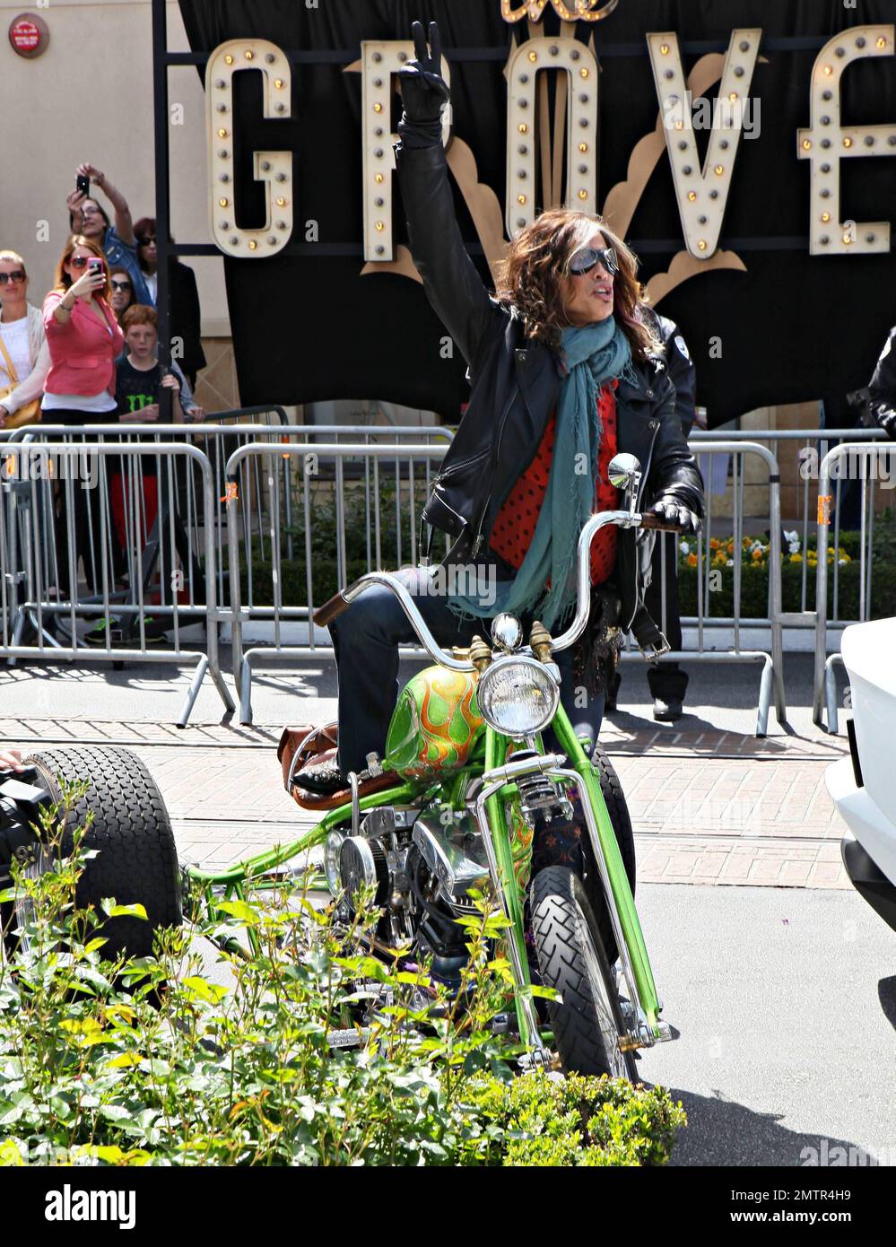 Steven Tyler arrives on a custom motorcycle tricycle at the press ...