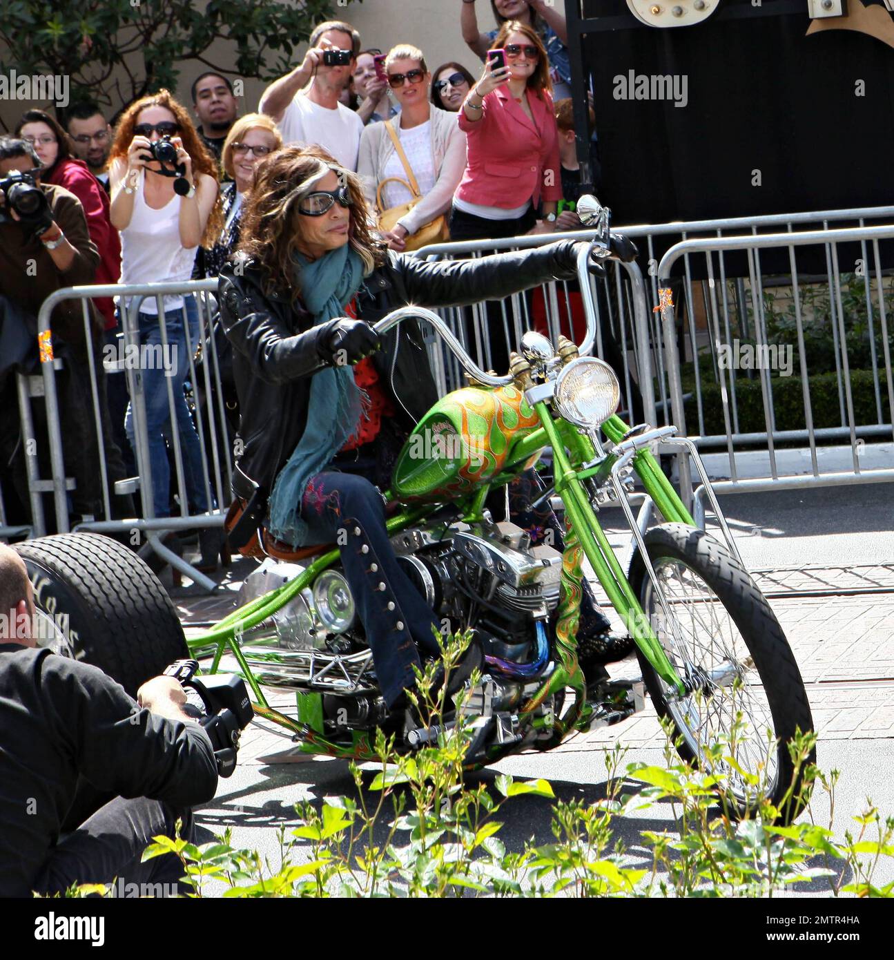 Steven Tyler arrives on a custom motorcycle tricycle at the press ...