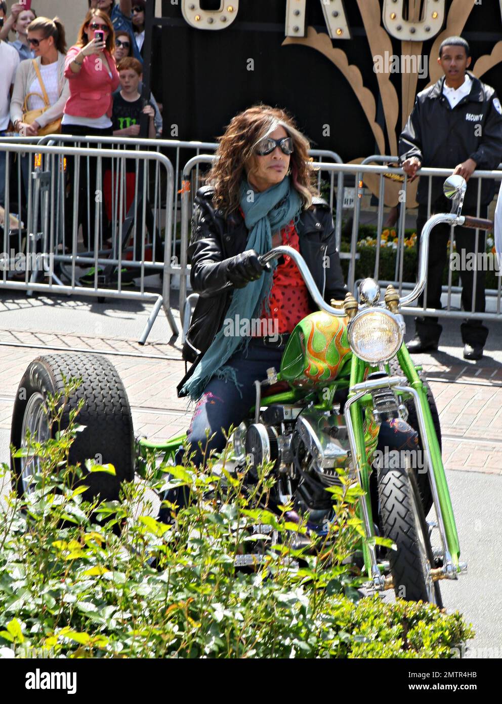 Steven Tyler arrives on a custom motorcycle tricycle at the press ...