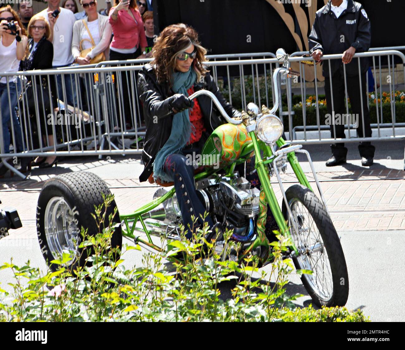 Steven Tyler arrives on a custom motorcycle tricycle at the press ...
