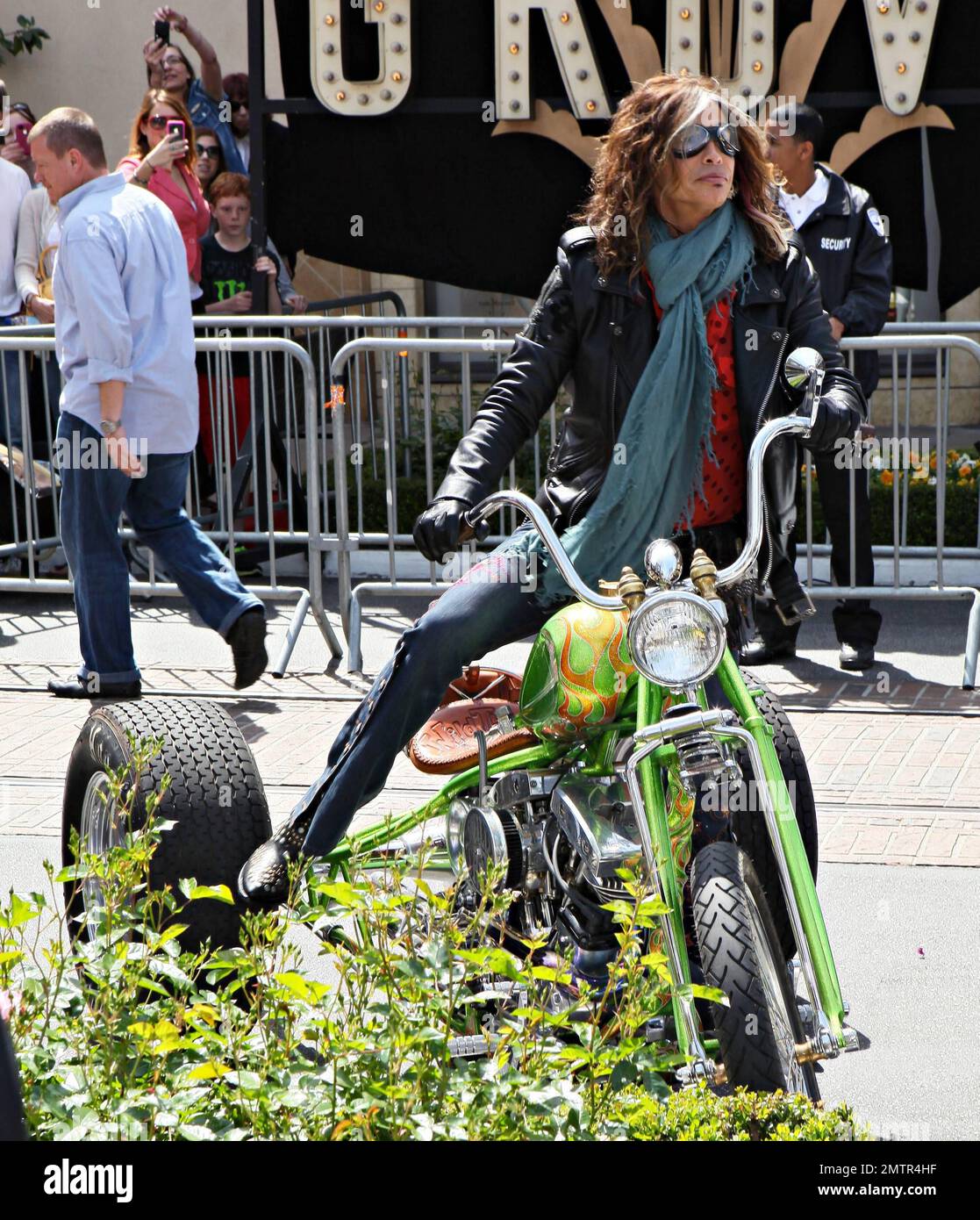 Steven Tyler arrives on a custom motorcycle tricycle at the press ...