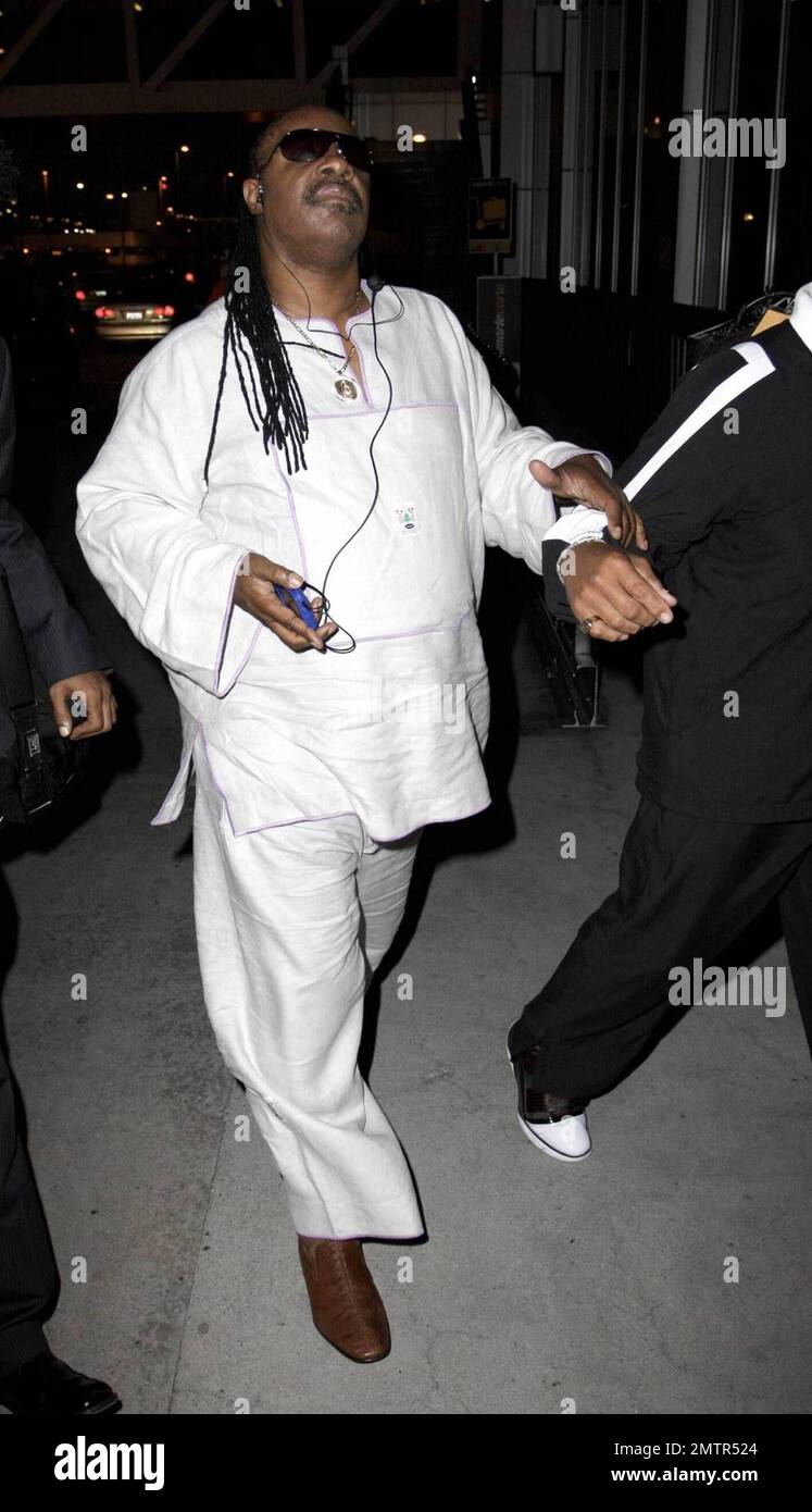 Music legend Stevie Wonder arrives at Los Angeles International Airport ...