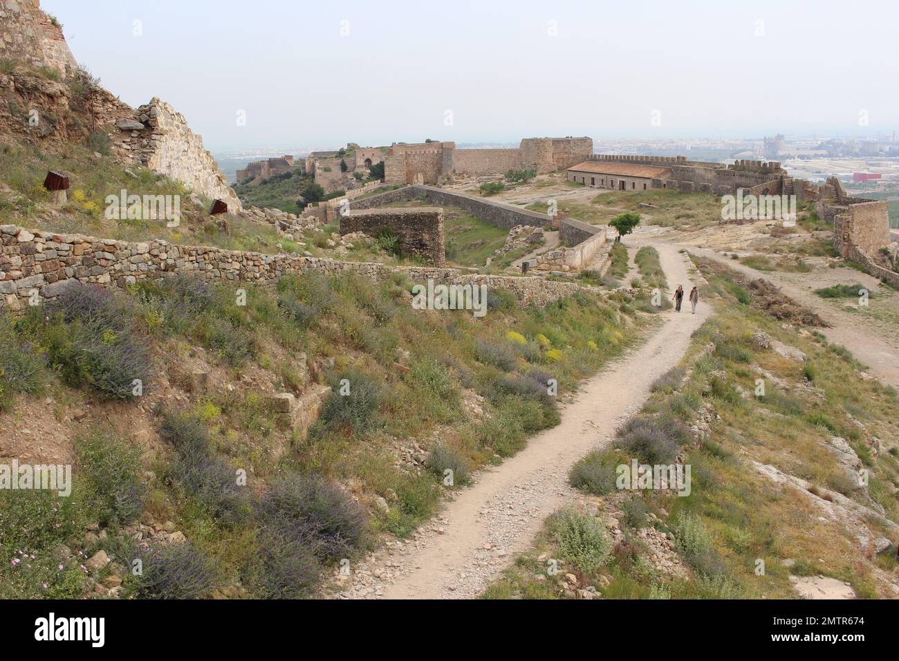 This April 25, 2017 photo shows tourists viewing the ruins of Sagunto ...