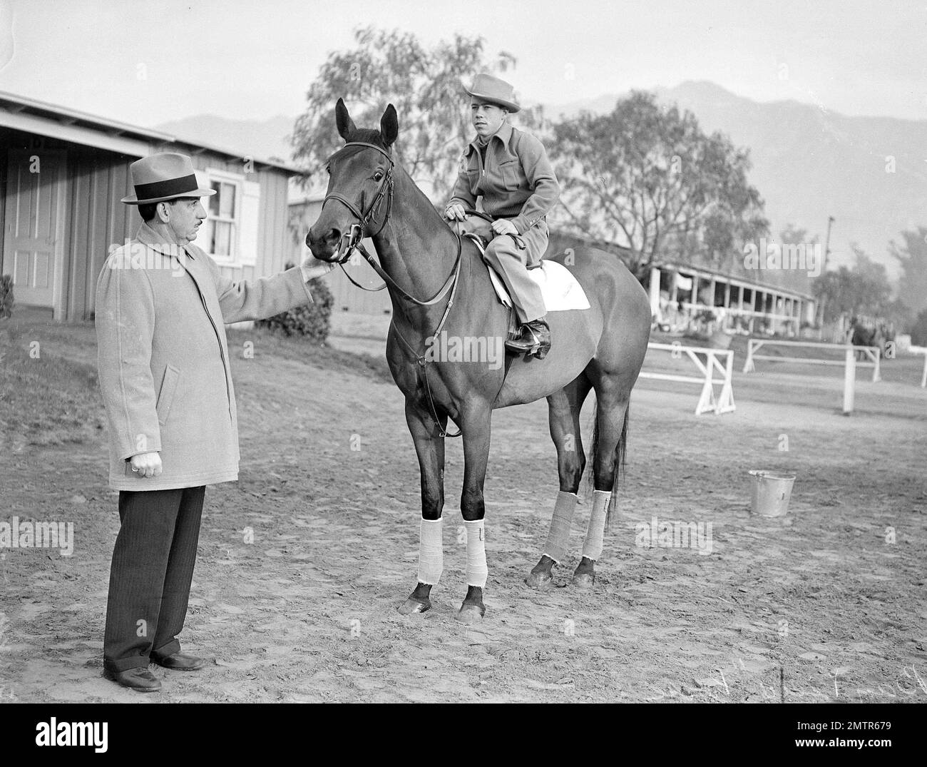 Thoroughbred Bay View, with jockey Basil James astride, and owner Tony ...