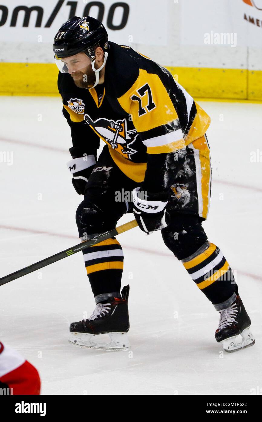 Pittsburgh Penguins' Bryan Rust skates slowly back to his bench after ...