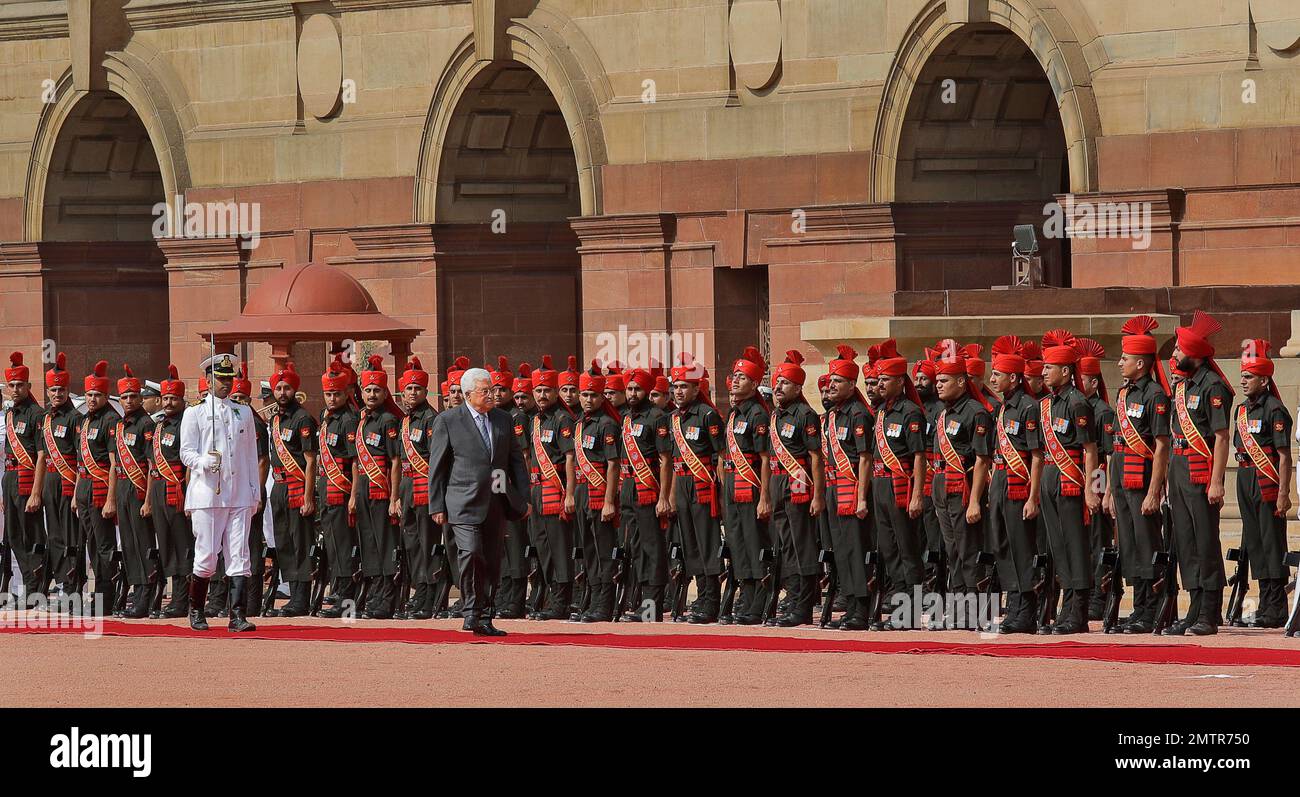Palestinian President Mahmoud Abbas inspects a military guard of honor ...