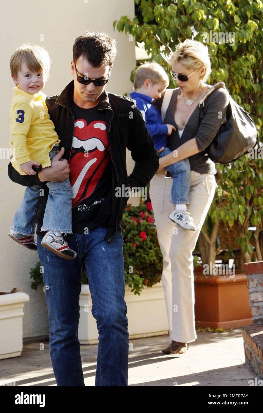 A very busty Sharon Stone was joined by her boyfriend and sons Laird ...